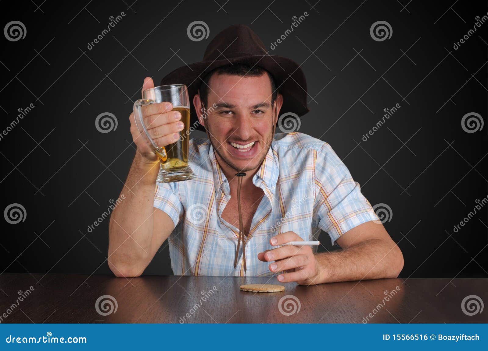 Cowboy having a beer stock photo. Image of arrogant, bottoms - 15566516