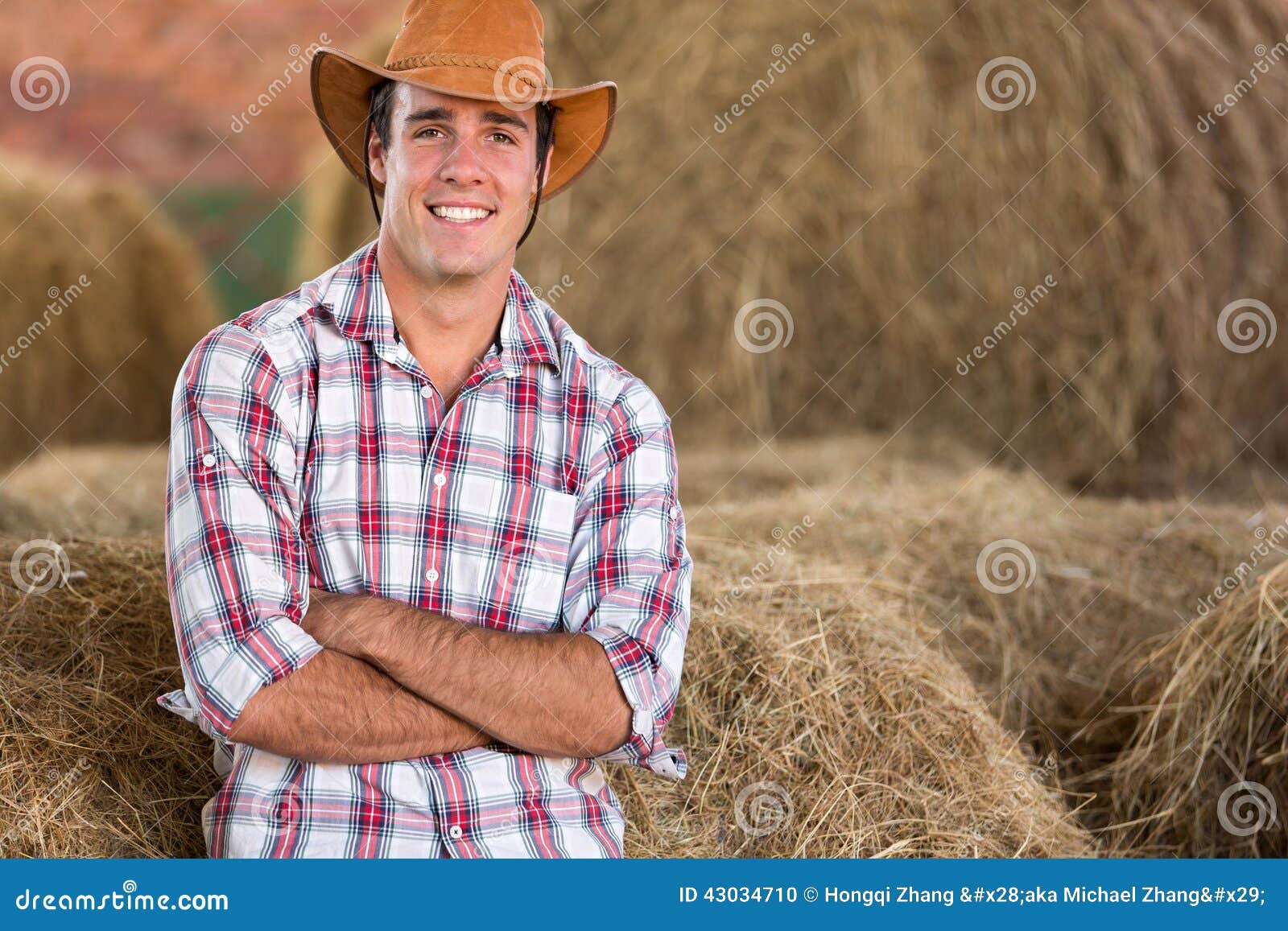 Cowboy hay bales stock photo. Image of handsome, inside - 43034710