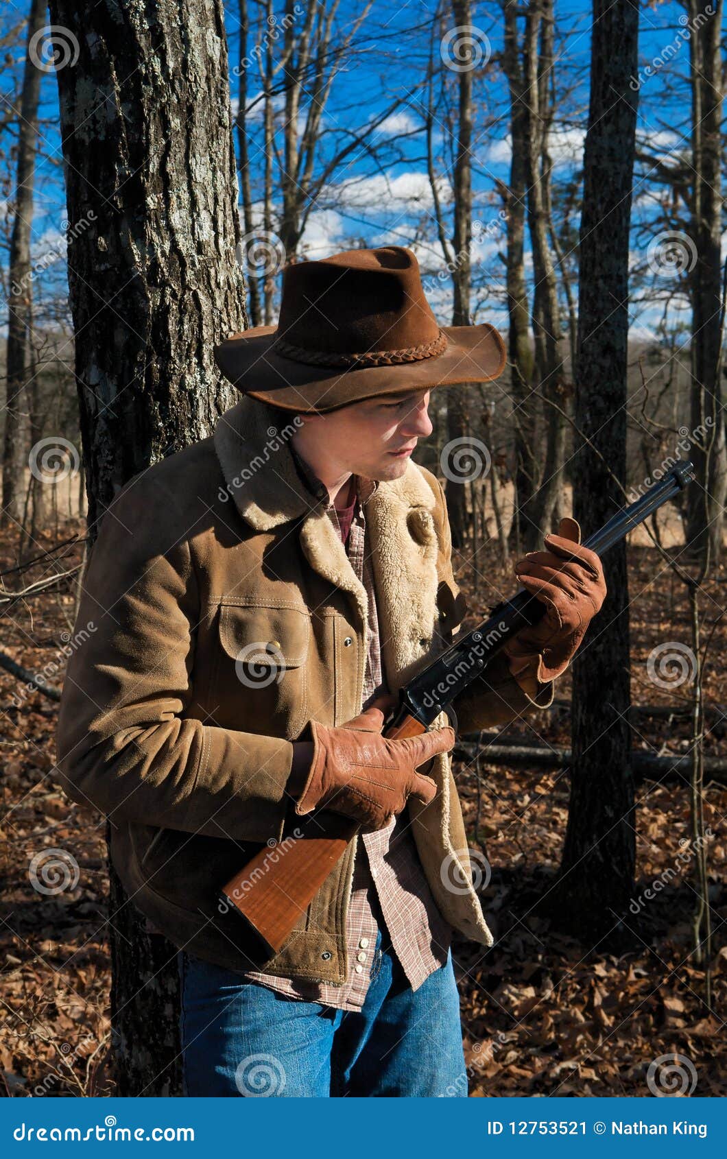 A Cowboy and His Rifle stock image. Image of action, film - 12753521