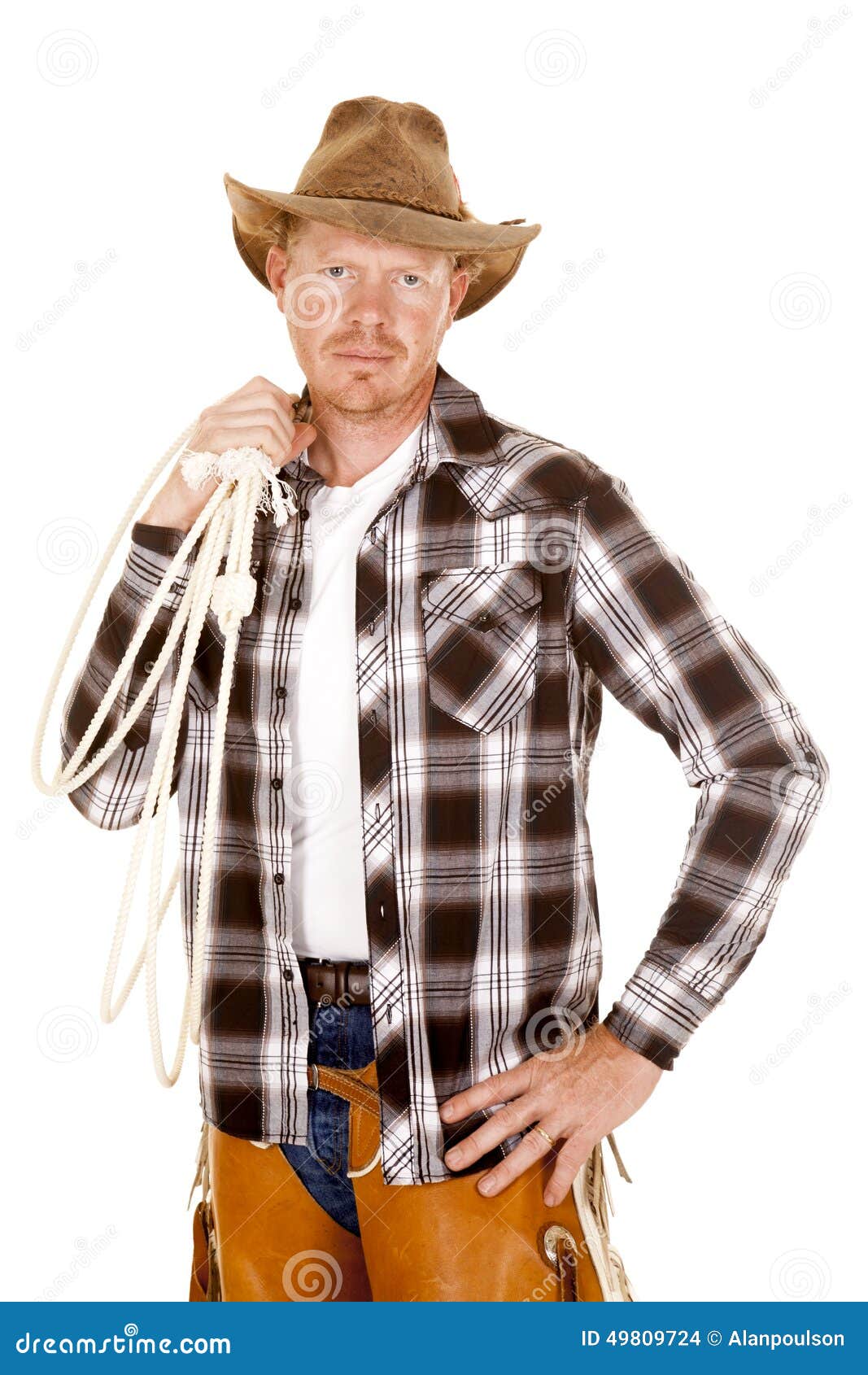 Cowboy Holding Rope Over Shoulder Looking Stock Photo - Image of middle ...