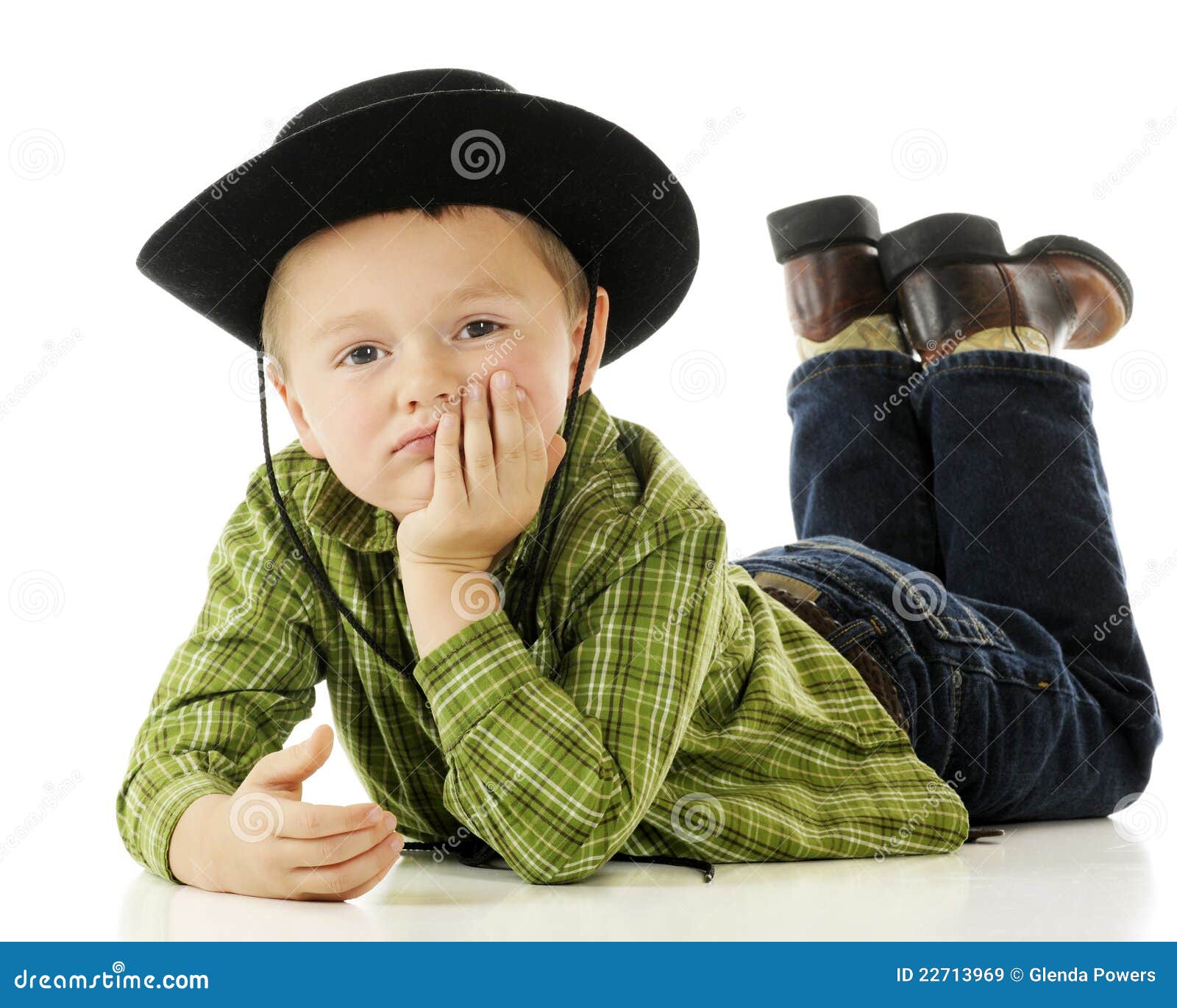 Cowboy Kid Relaxing stock image. Image of relaxed, jeans - 22713969