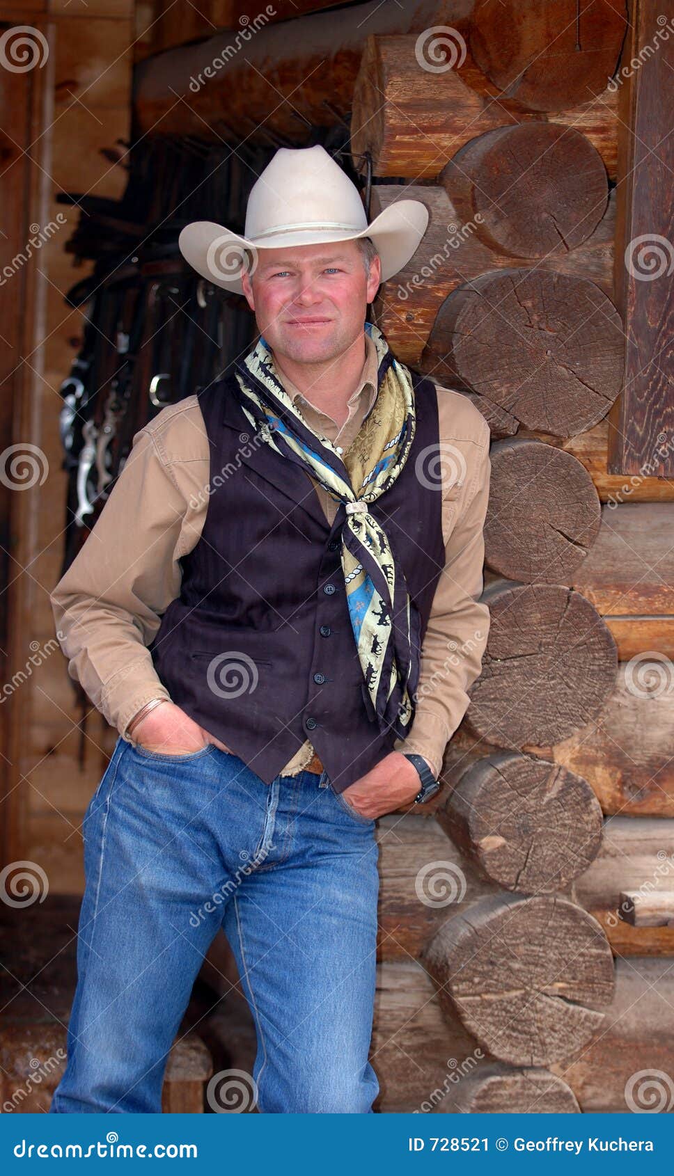 Cowboy Leaning Against Building - Front Stock Image - Image of bandanna ...