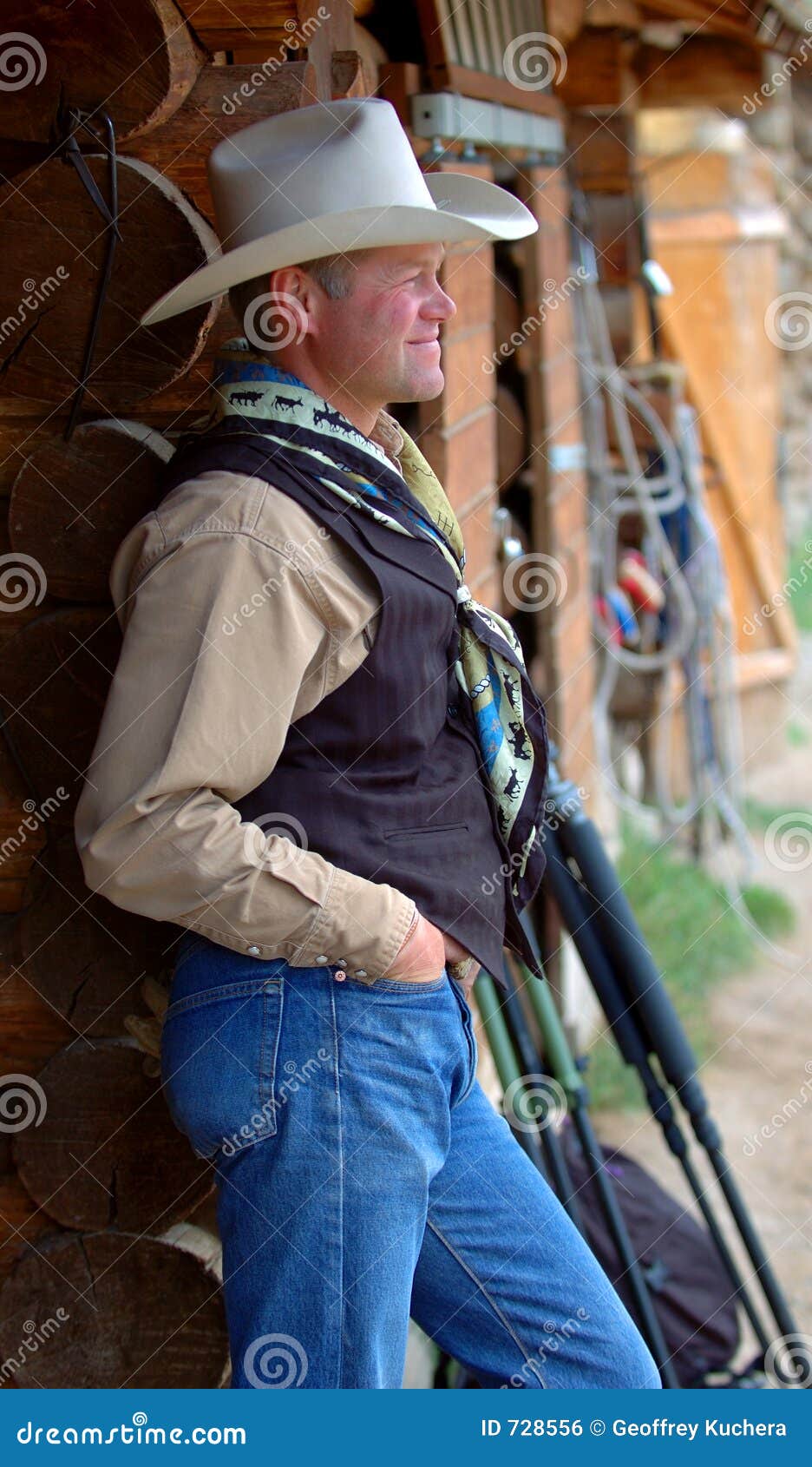Cowboy Leans On Fence Stock Photo | CartoonDealer.com #728700