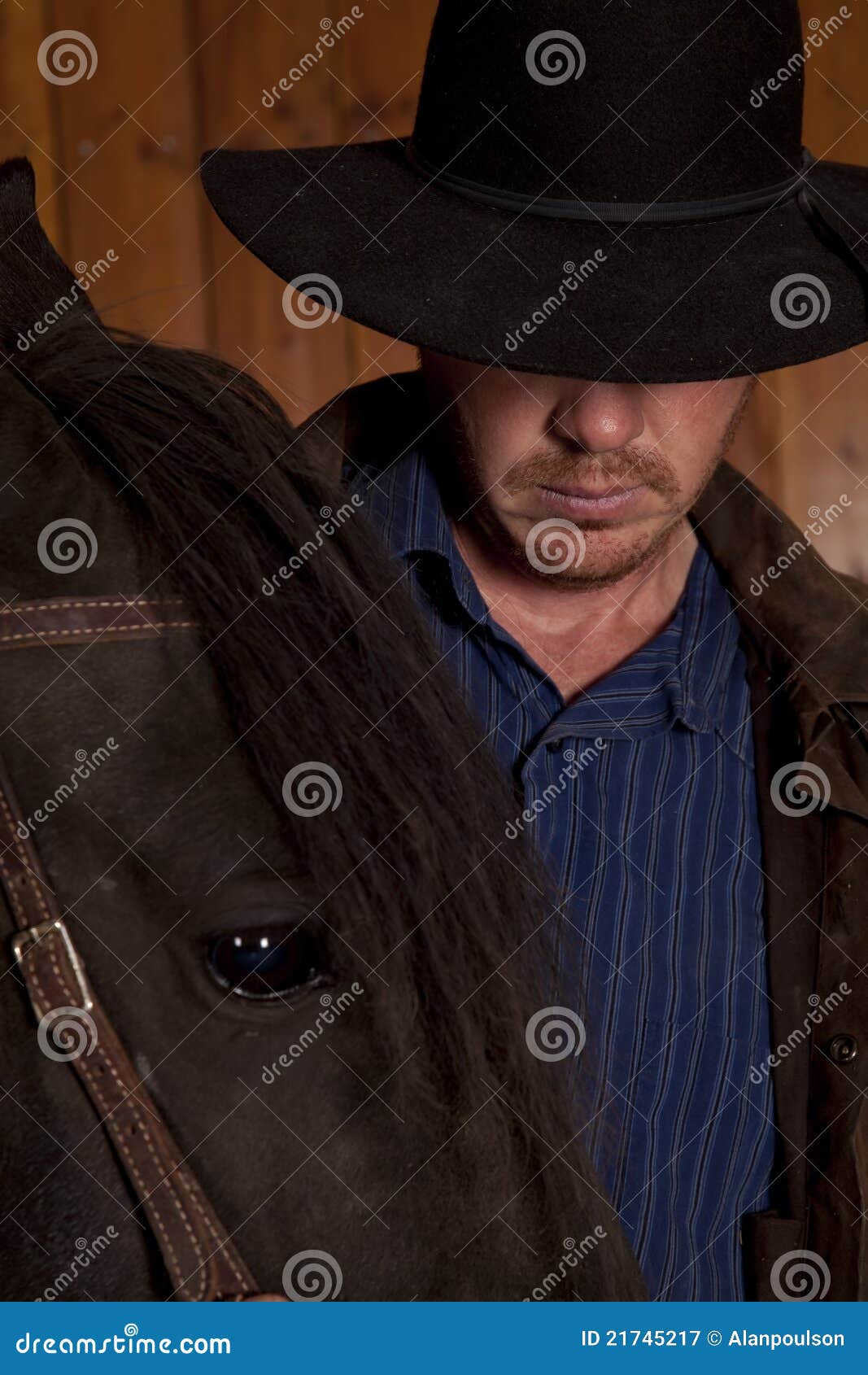 Cowboy Looking Down by Horse Head Stock Image - Image of color ...