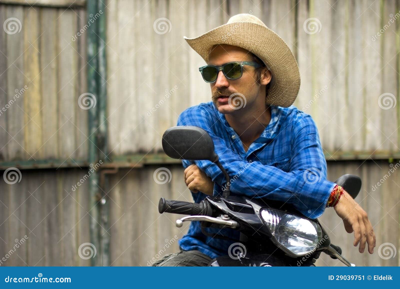 Cowboy on motorbike stock image. Image of model, cute - 29039751
