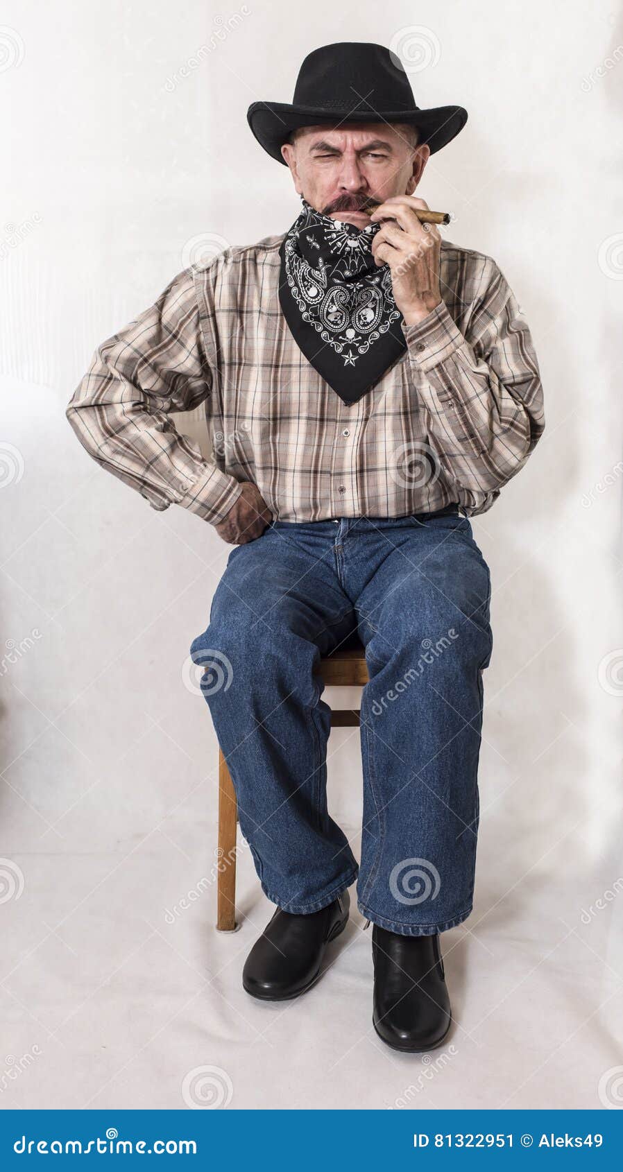 The Cowboy with Mustache, in a Black Hat Smoking a Cigar Stock Image ...