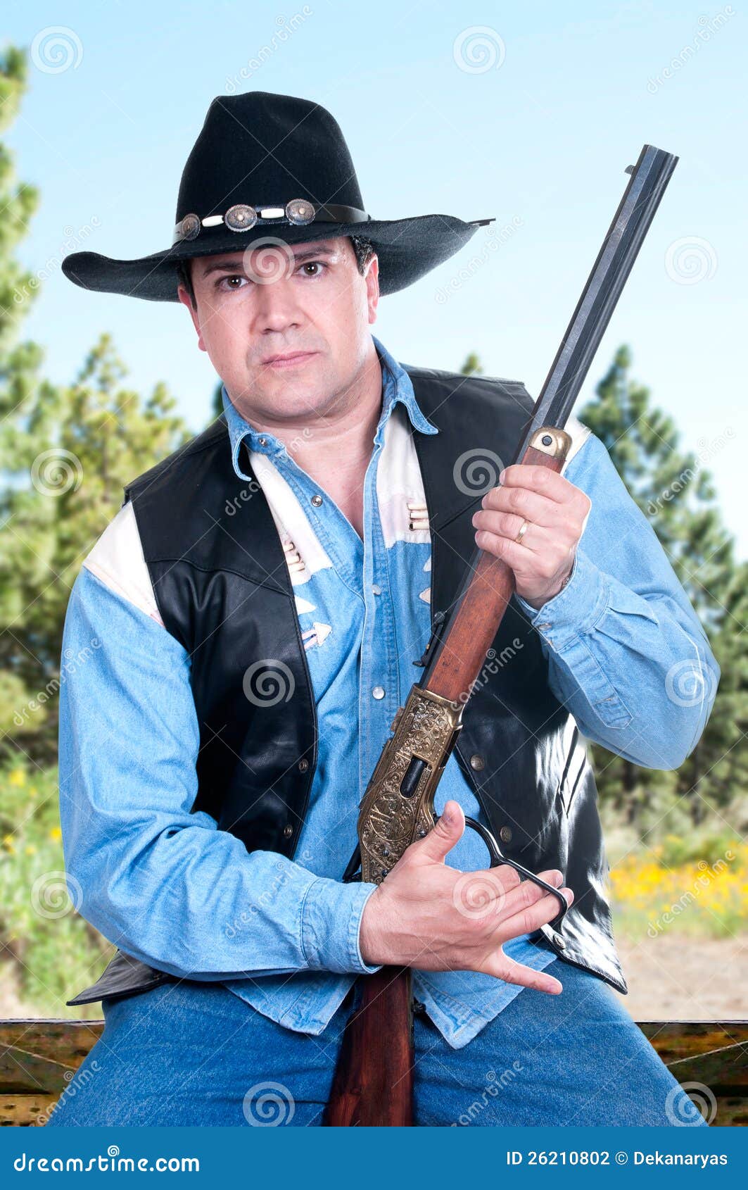 Cowboy pointing a rifle stock photo. Image of white, rifle - 26210802
