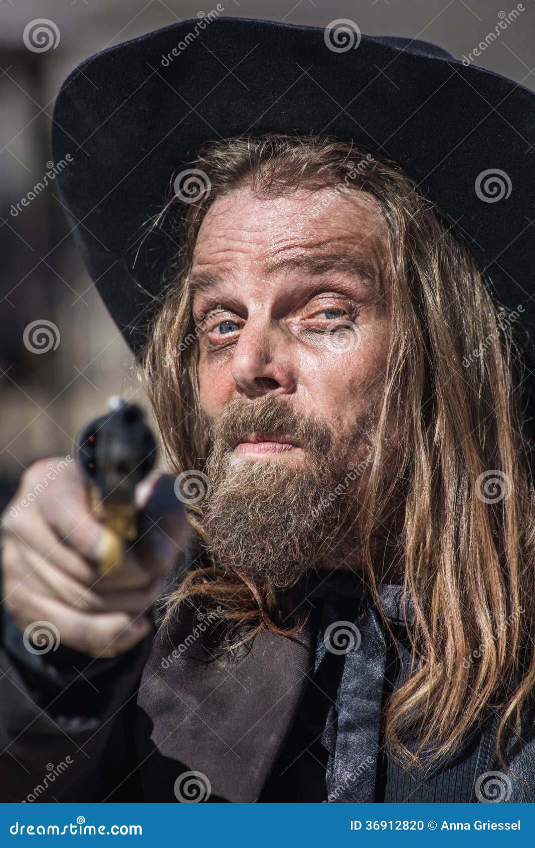 Cowboy Points Gun at You stock photo. Image of middleaged - 36912820