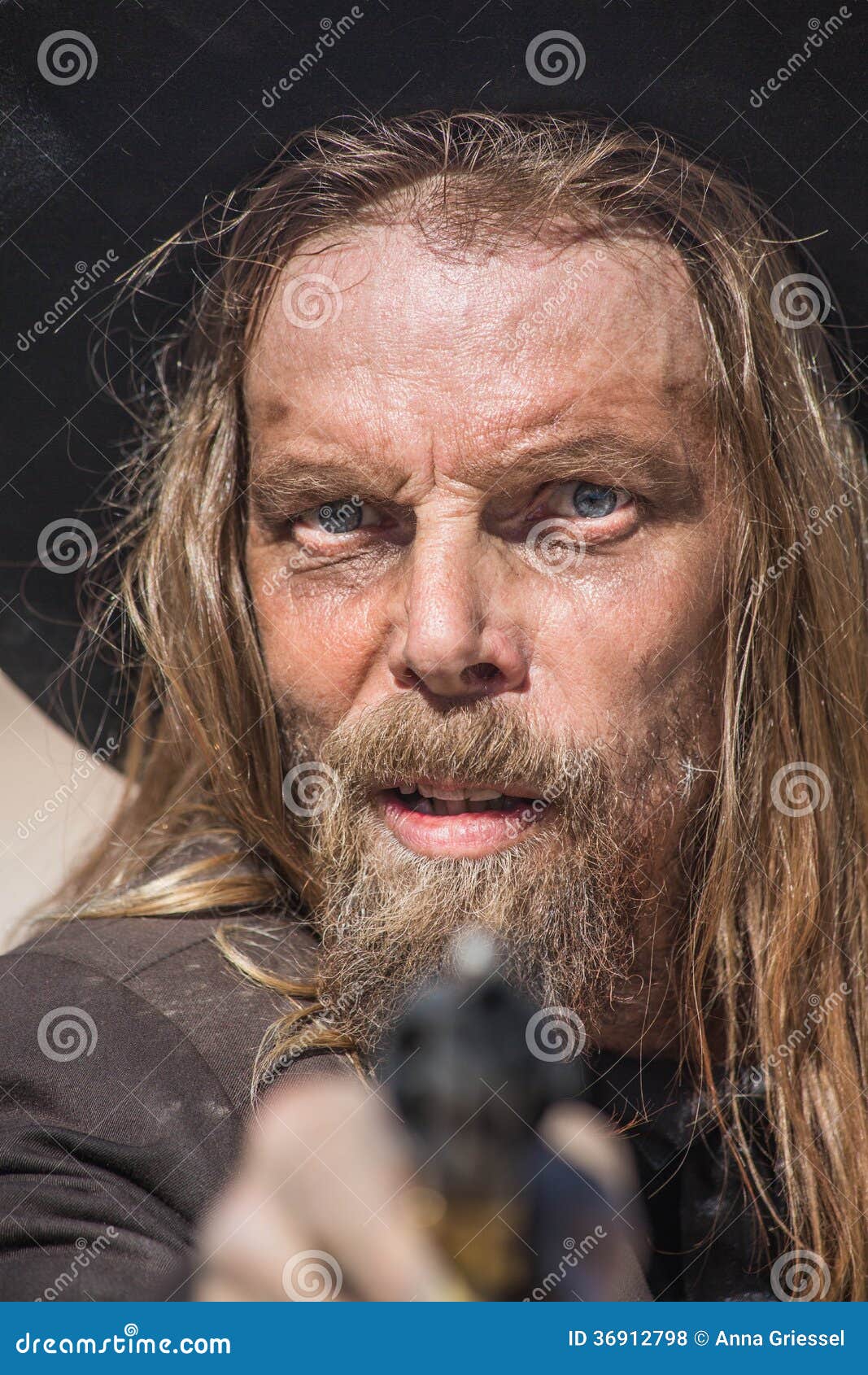 Cowboy Points Gun at You stock photo. Image of shootout - 36912798