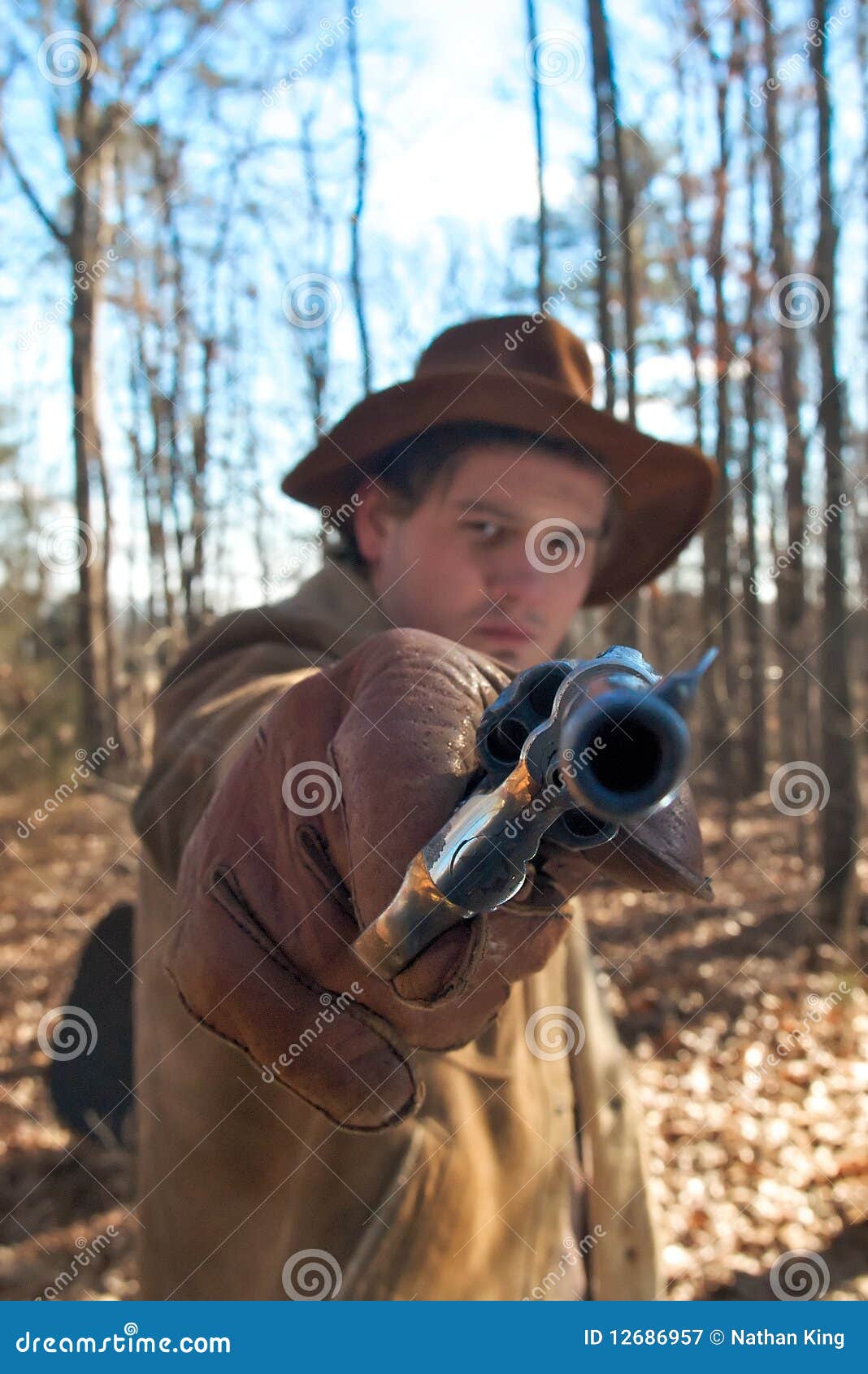 Cowboy with Revolver stock image. Image of confident - 12686957