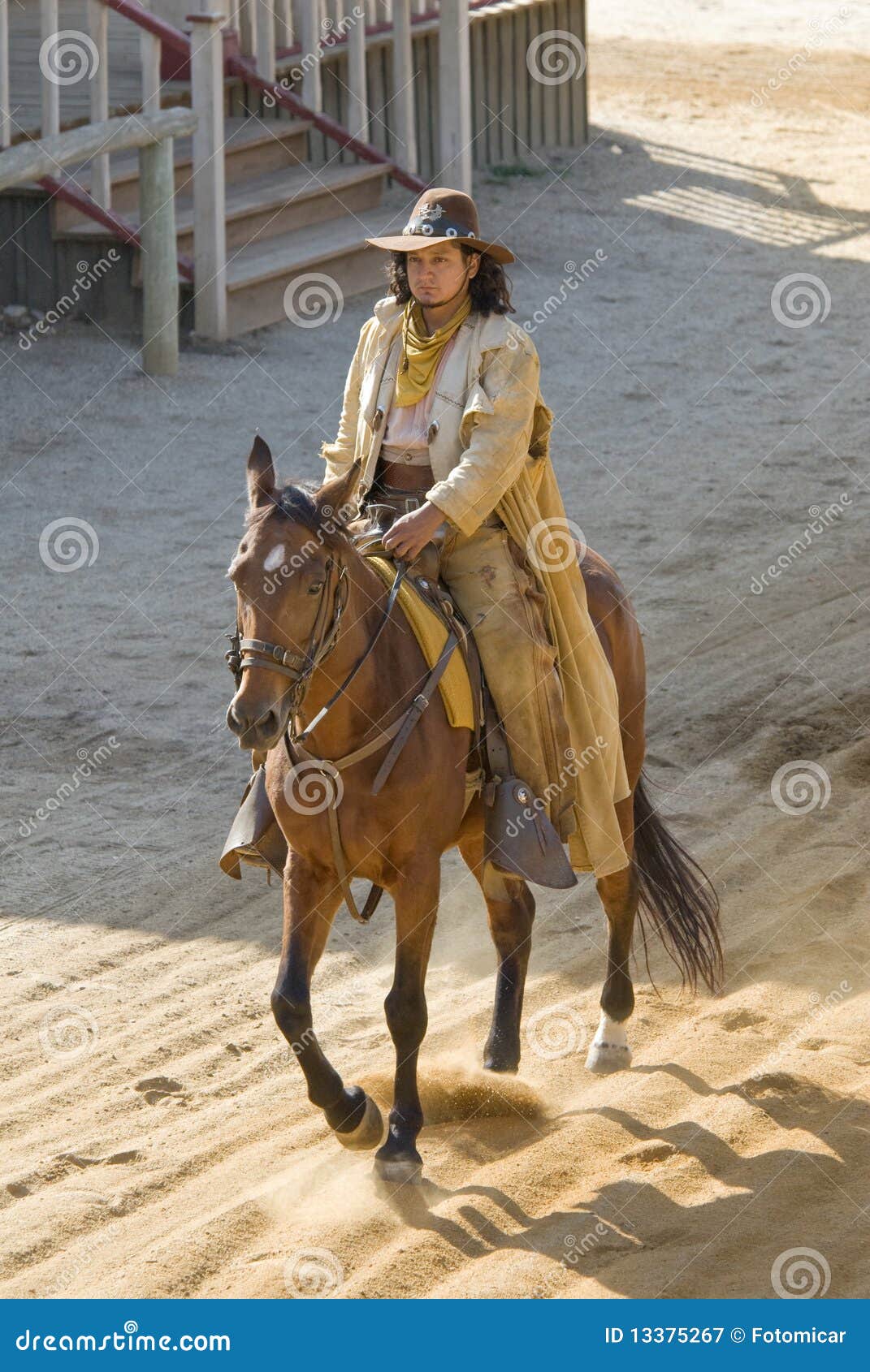 Cowboy Riding A Horse Carrying A He Cowboy Is On The Horse, Standing In ...