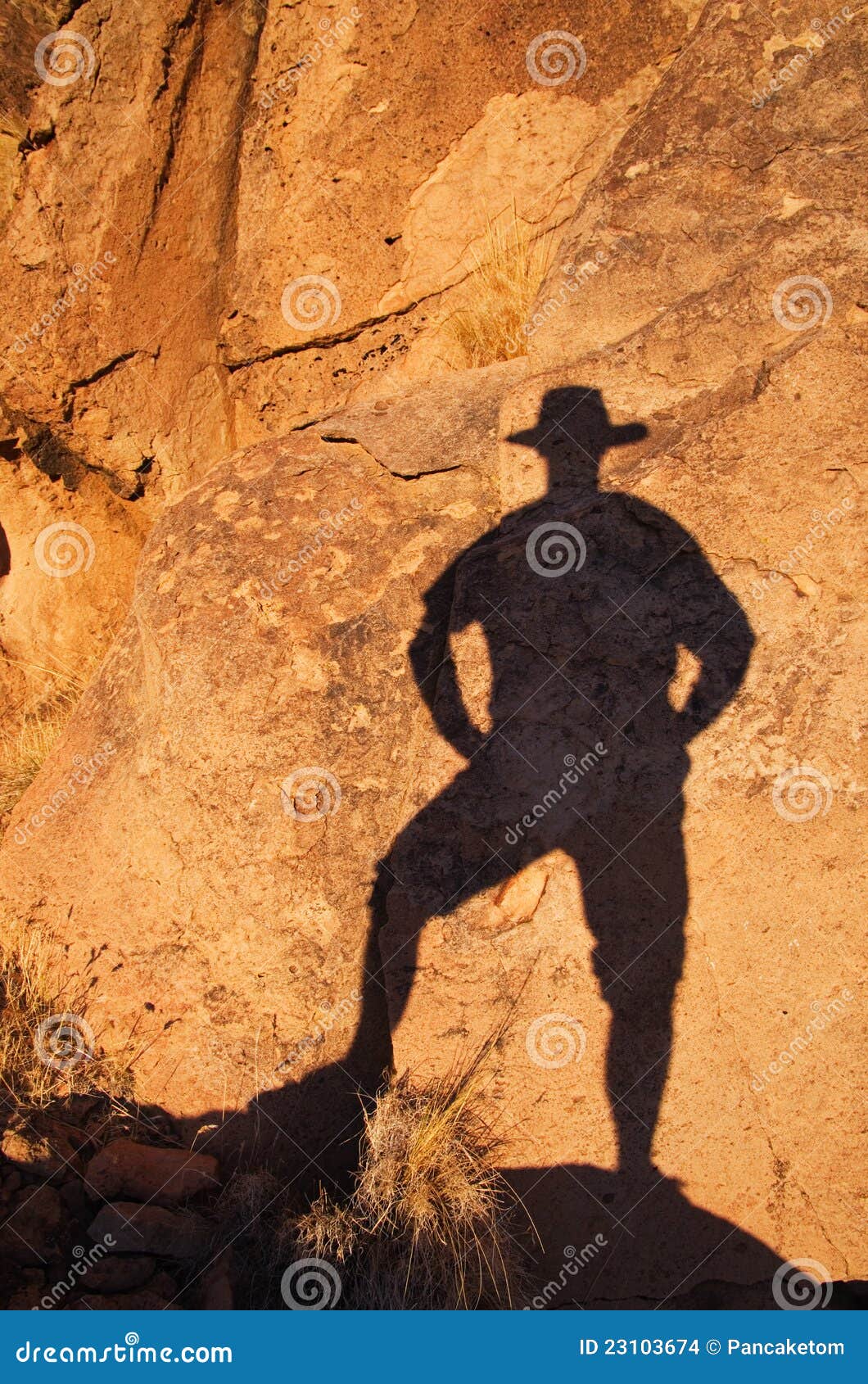 Cowboy shadow on rock stock photo. Image of wall, shadow - 23103674