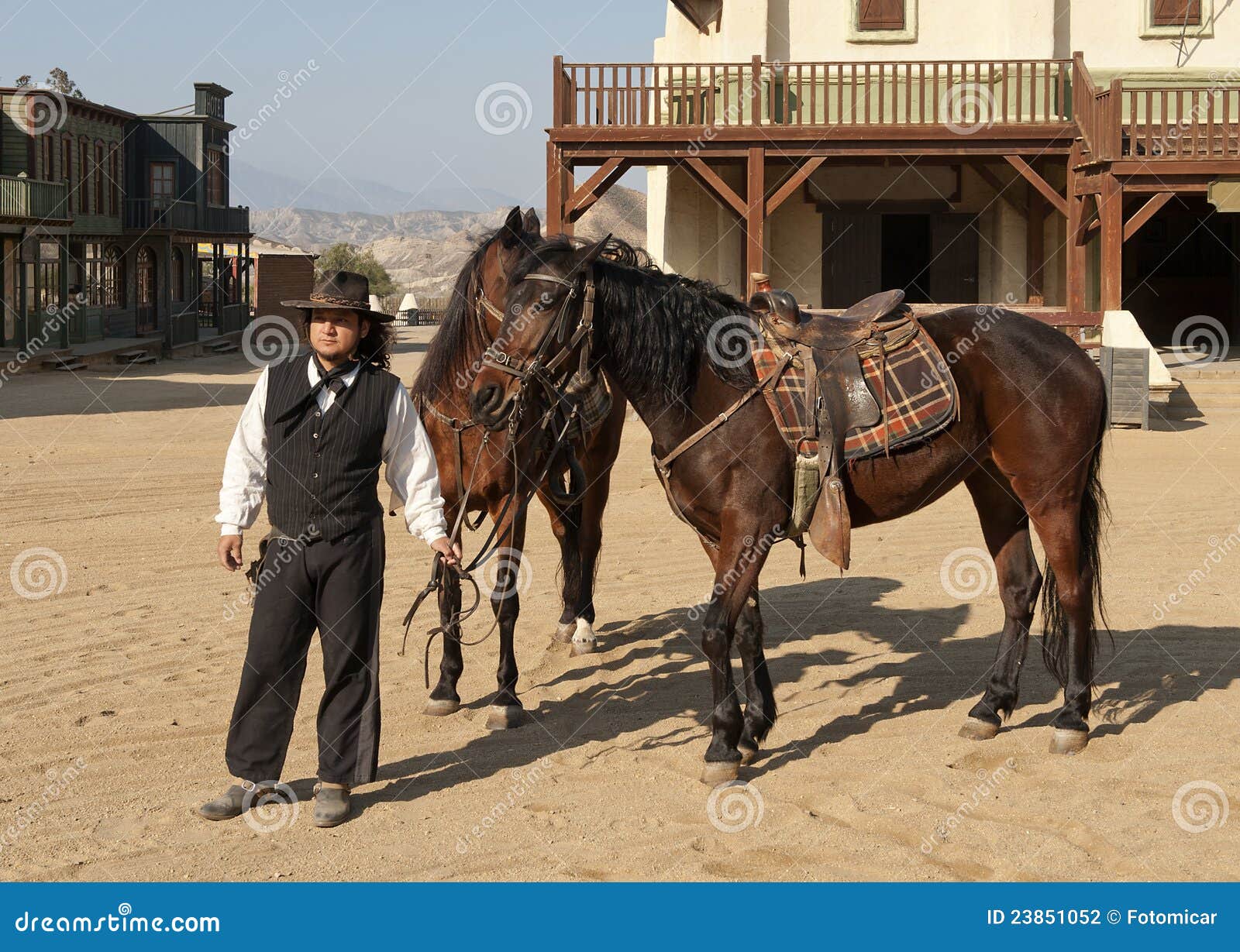 Cowboy Sheriff and horses stock photo. Image of sunny - 23851052