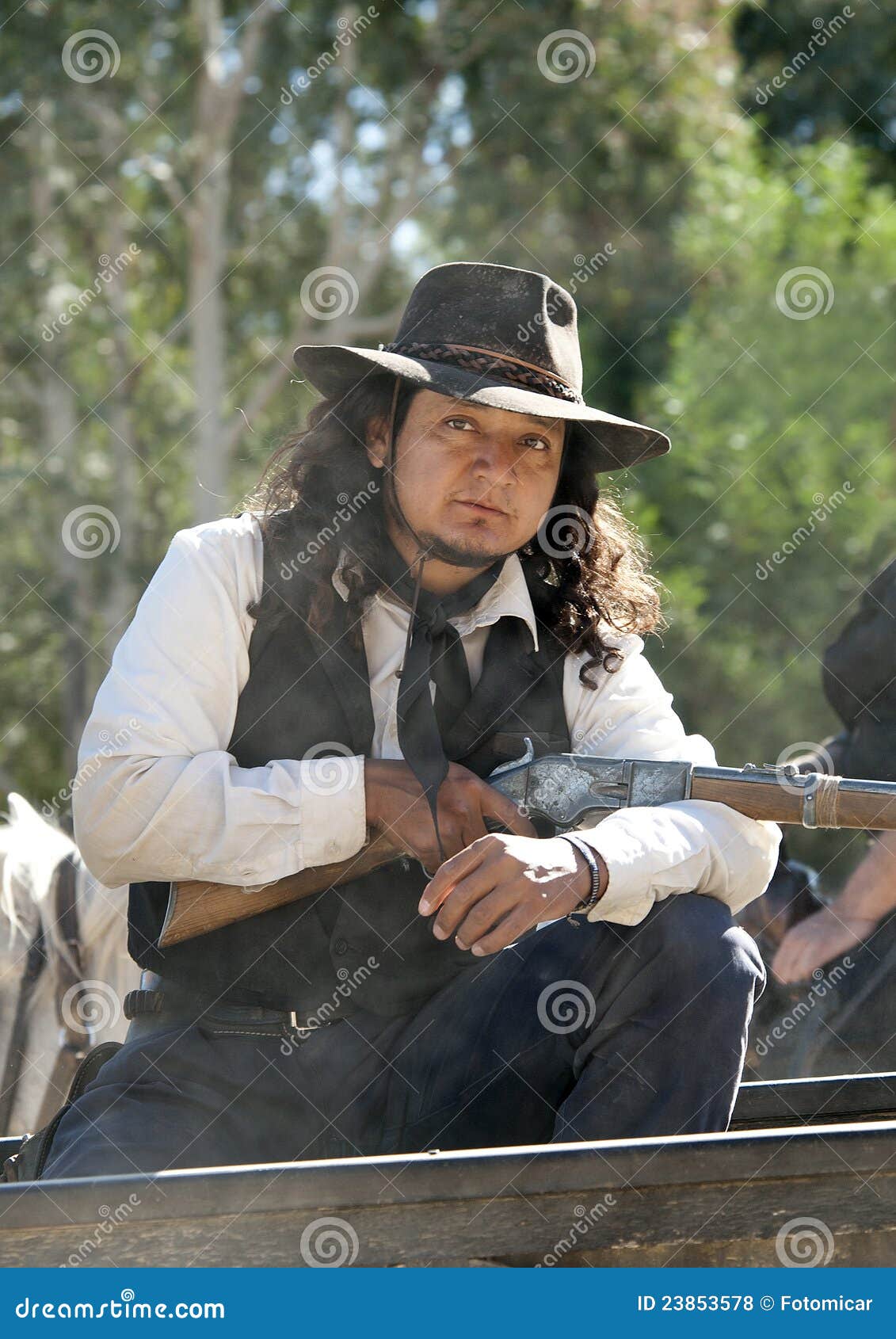 Cowboy Sheriff on a wagon stock photo. Image of westerns - 23853578