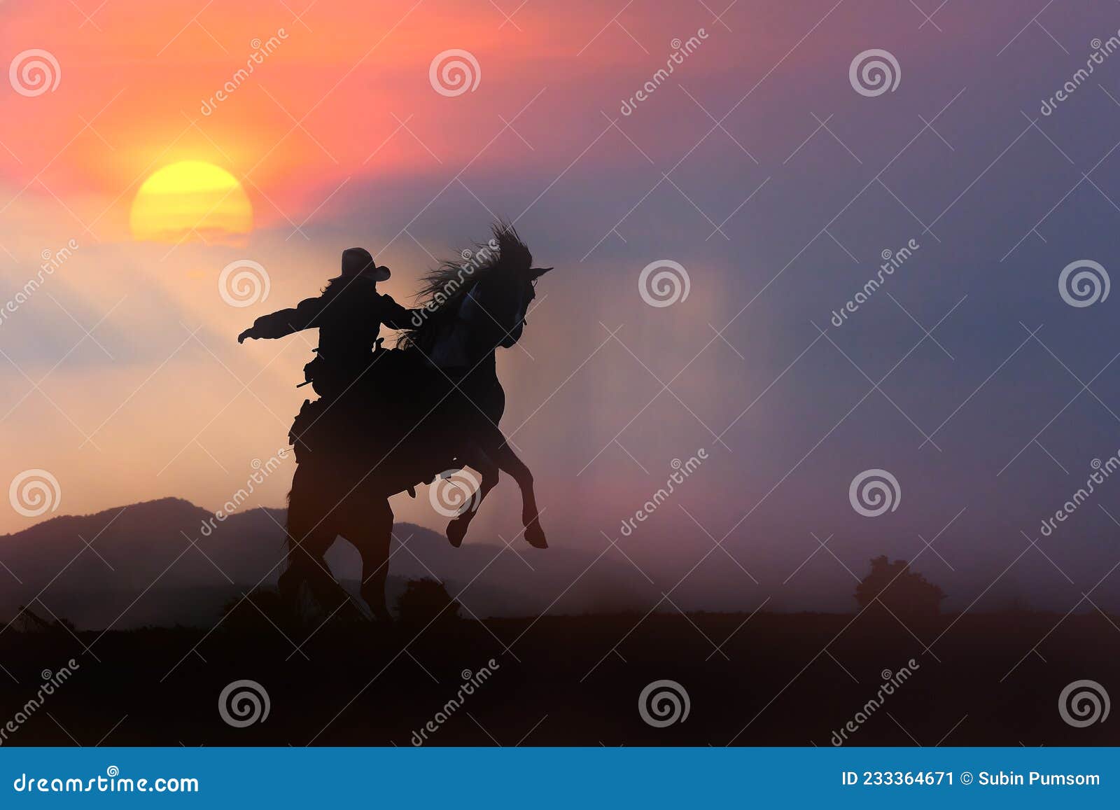 Cowboy Silhouette on Horseback with Mountain View and Sunset Sky Stock ...