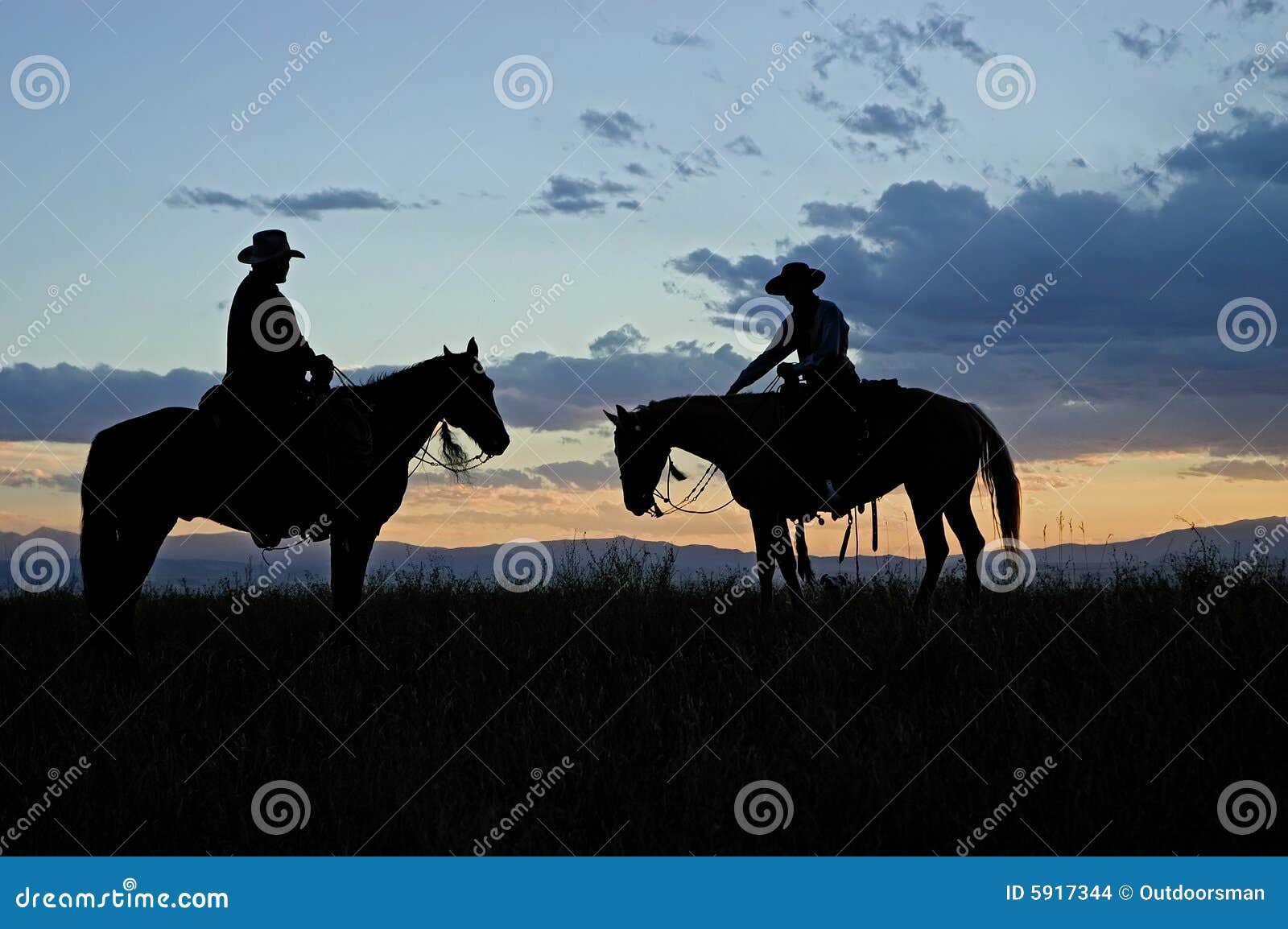 Cowboy silhouettes stock photo. Image of americana, cowboy - 5917344