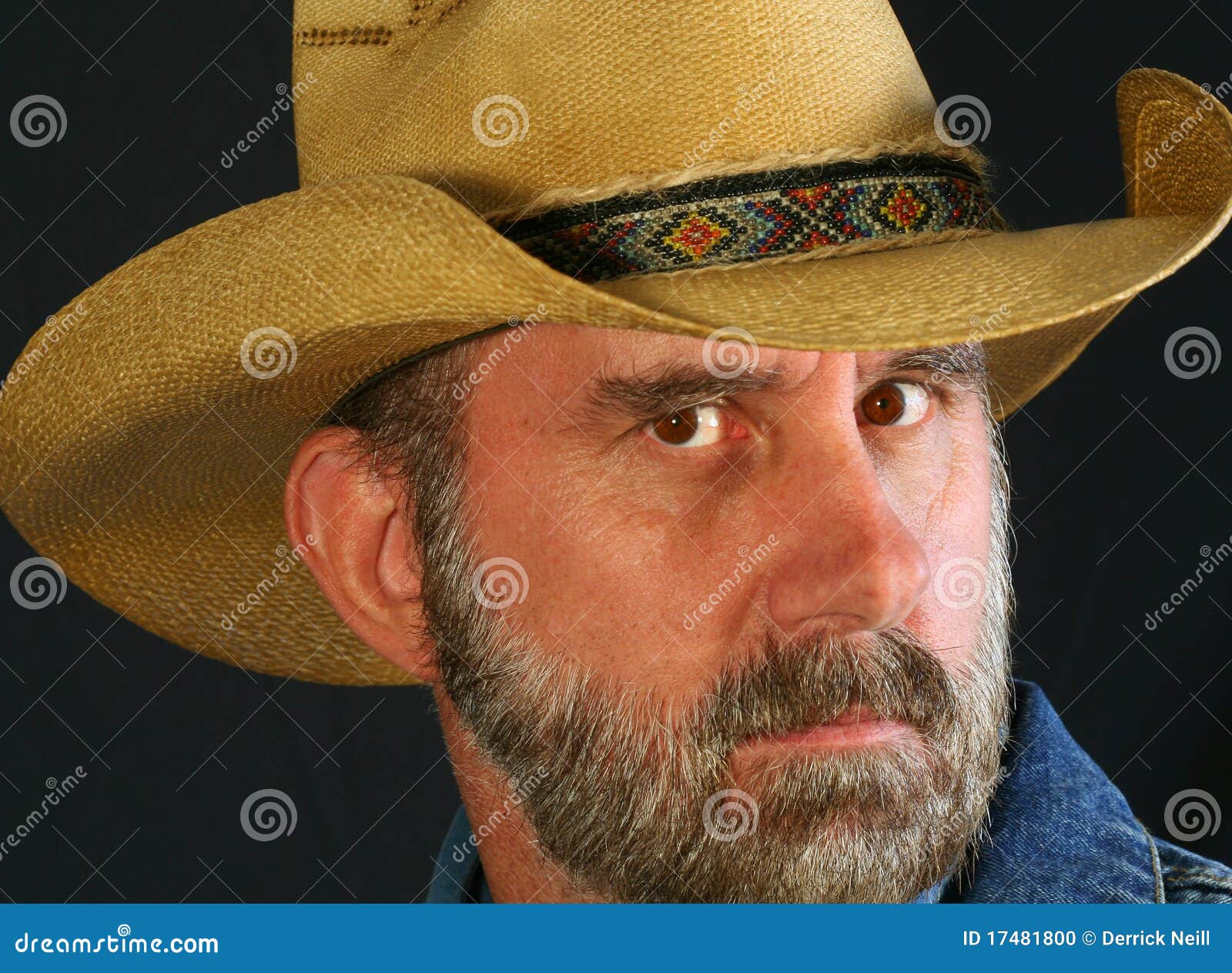 A Cowboy with Slightly Raised Brow Stock Photo - Image of denim, males ...