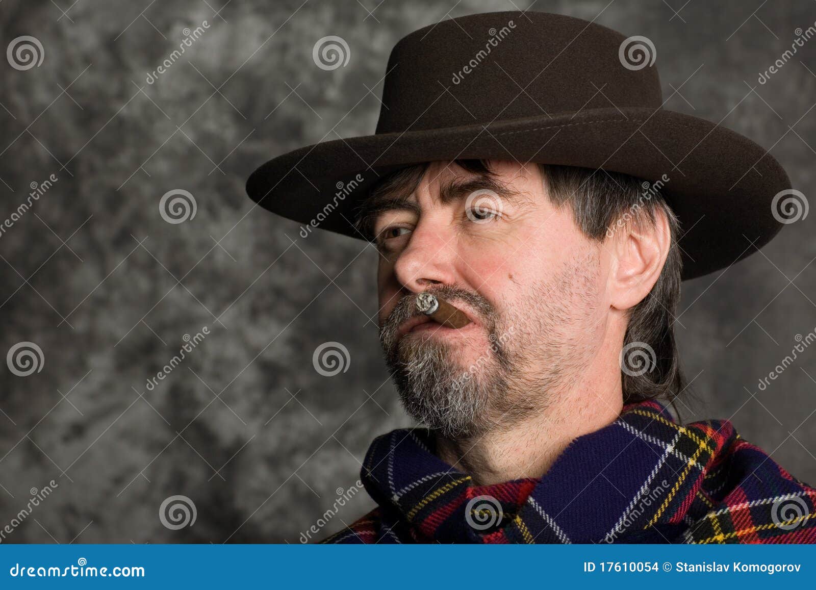 Cowboy smoking a cigar stock photo. Image of person, rural - 17610054