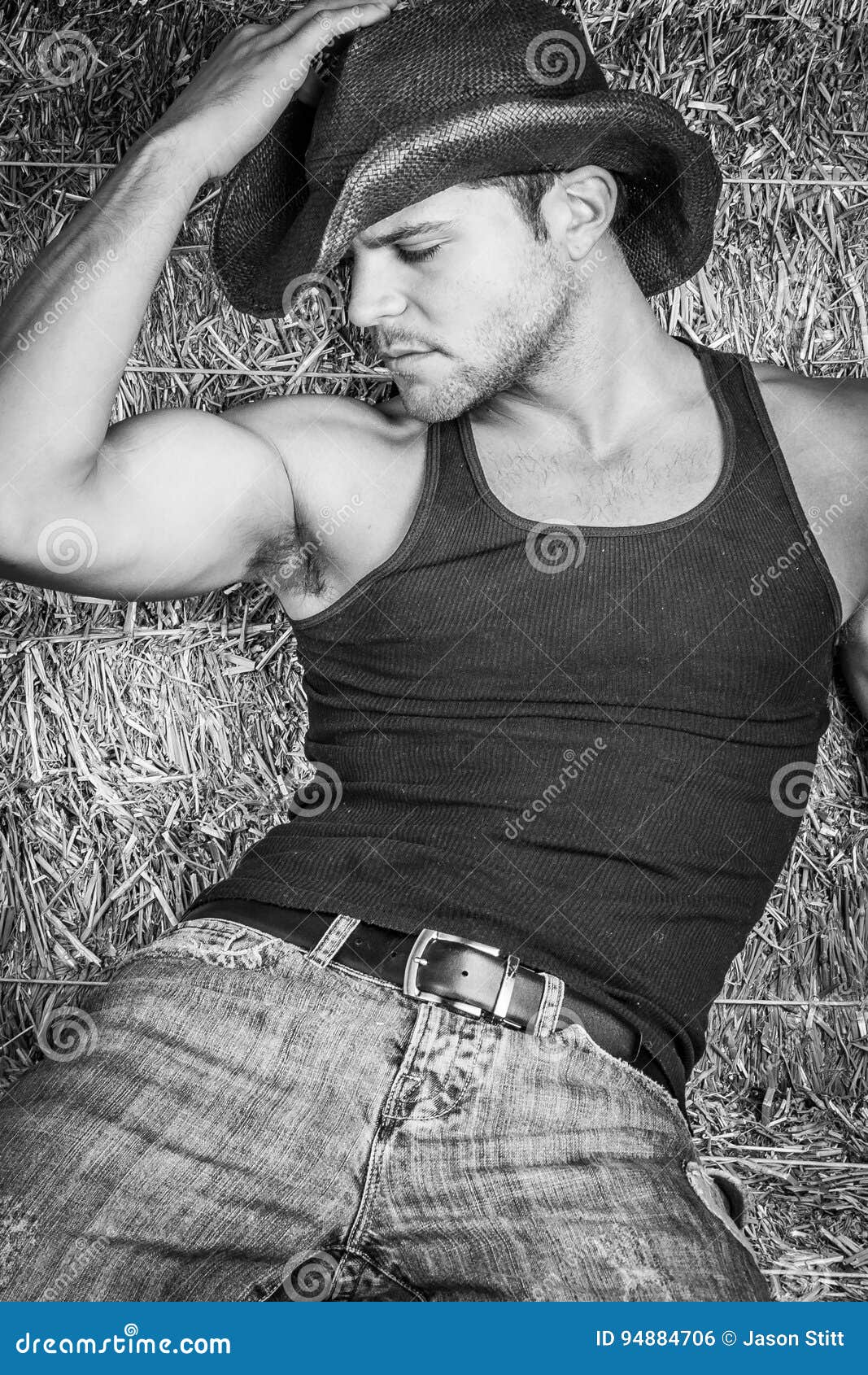 Cowboy in Straw stock photo. Image of sitting, adult - 94884706