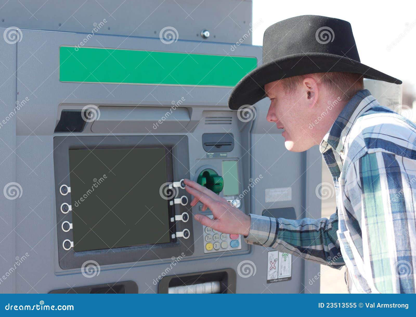 Cowboy Using ATM Machine stock image. Image of male, machine - 23513555