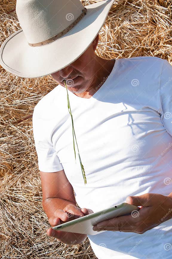 Cowboy Using Tablet Computer Stock Image - Image of cowboy, notebook ...
