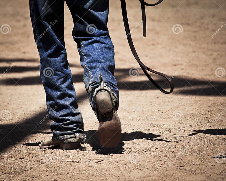 Cowboy Walking stock image. Image of rodeo, spurs, blue - 23925629