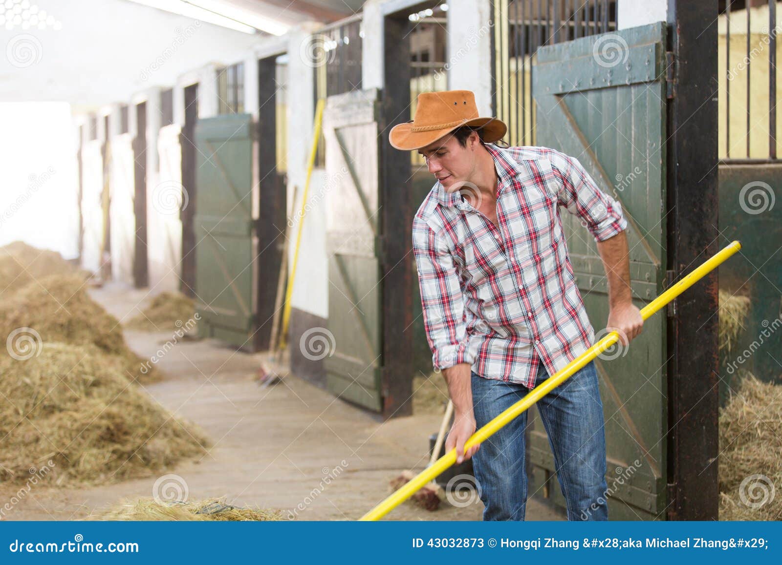 Cowboy working stable stock image. Image of checked, cowboy - 43032873