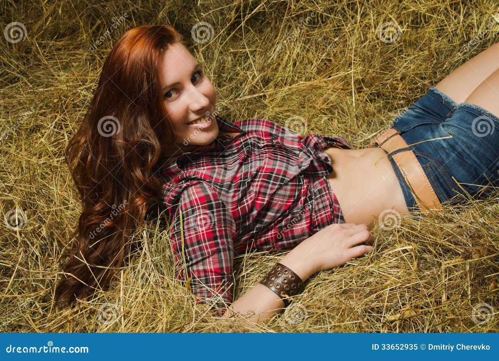 Cowgirl Lying On Hay In The Stable Royalty Free Stock Photo - Image ...