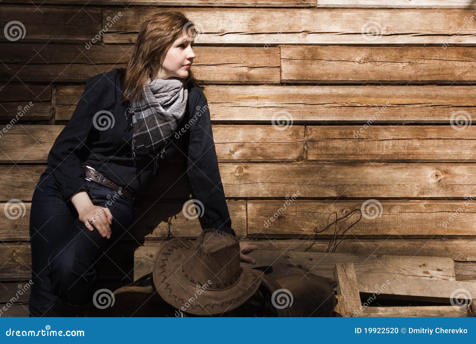 Cowgirl on a ranch stock photo. Image of brunette, farm - 19922520