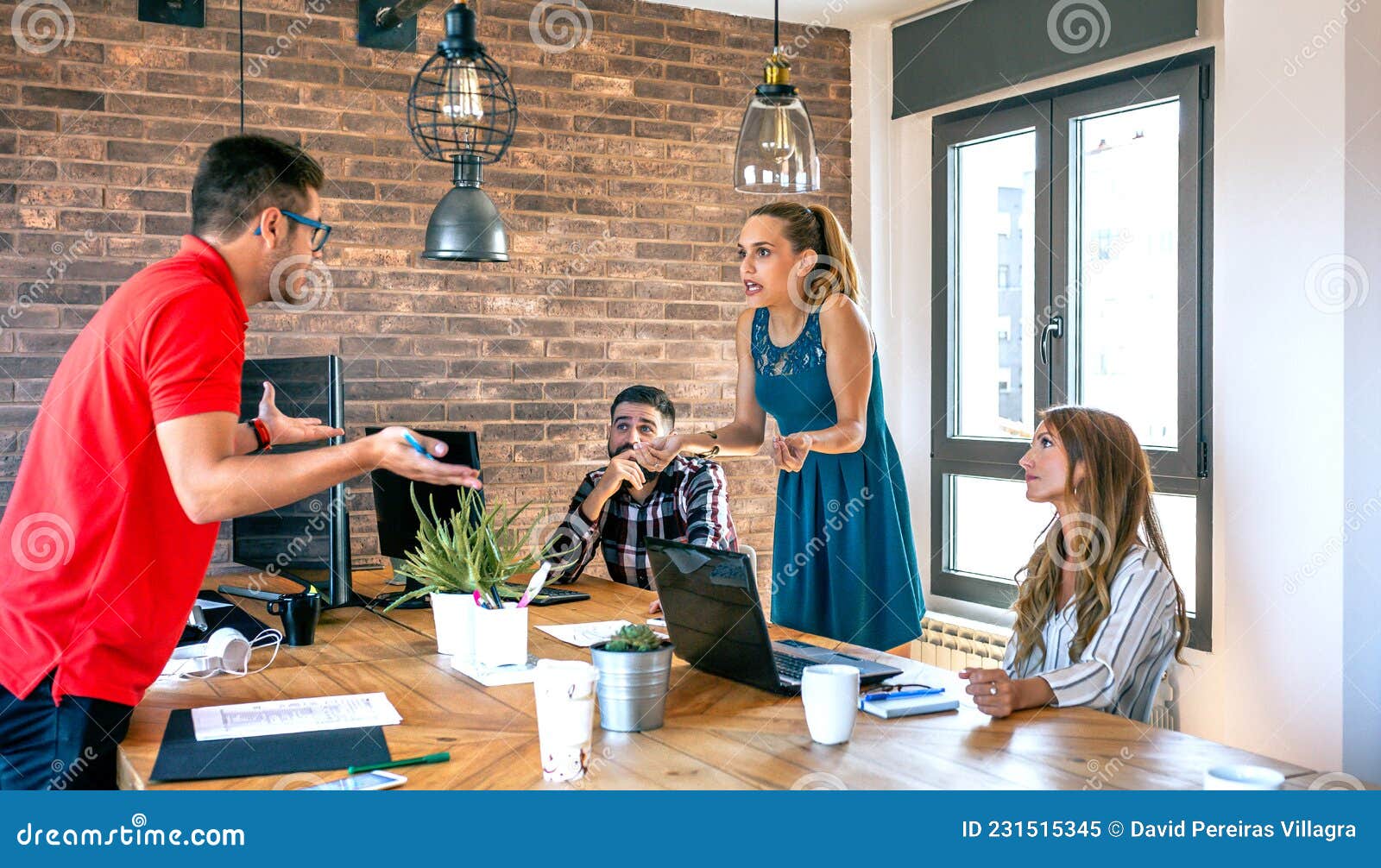 Coworkers Arguing in the Office Stock Image - Image of four, coworkers ...