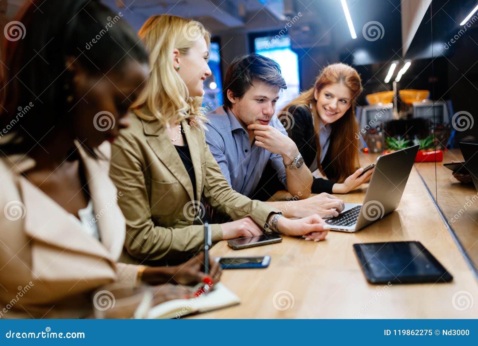 Coworkers bonding in pub stock image. Image of enjoyment - 119862275