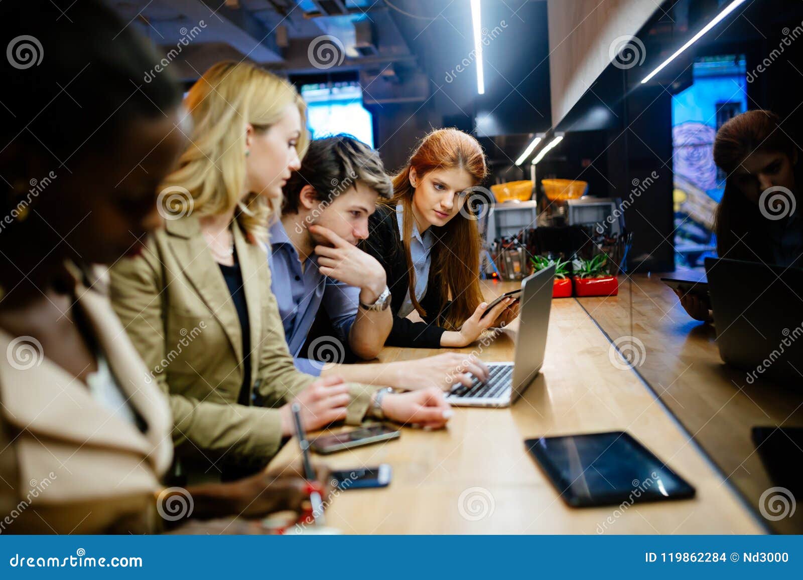 Coworkers bonding in pub stock photo. Image of newspaper - 119862284