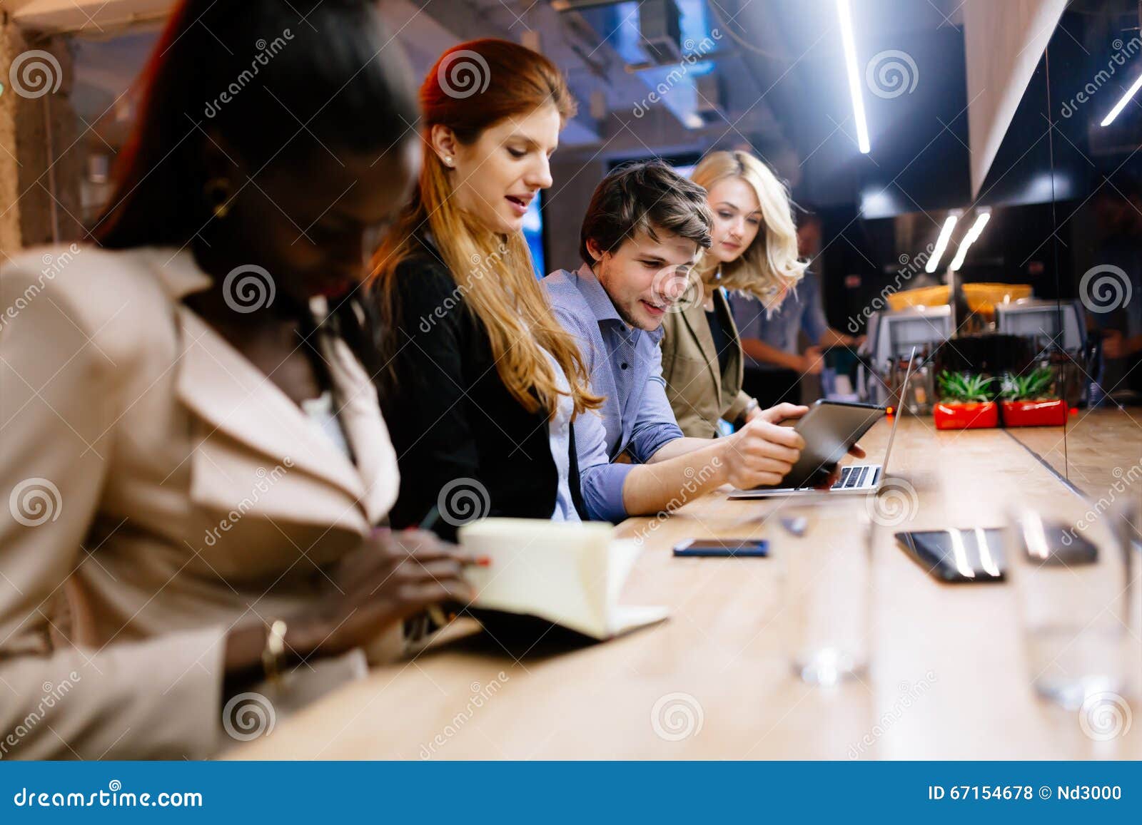 Coworkers bonding in pub stock photo. Image of activity - 67154678