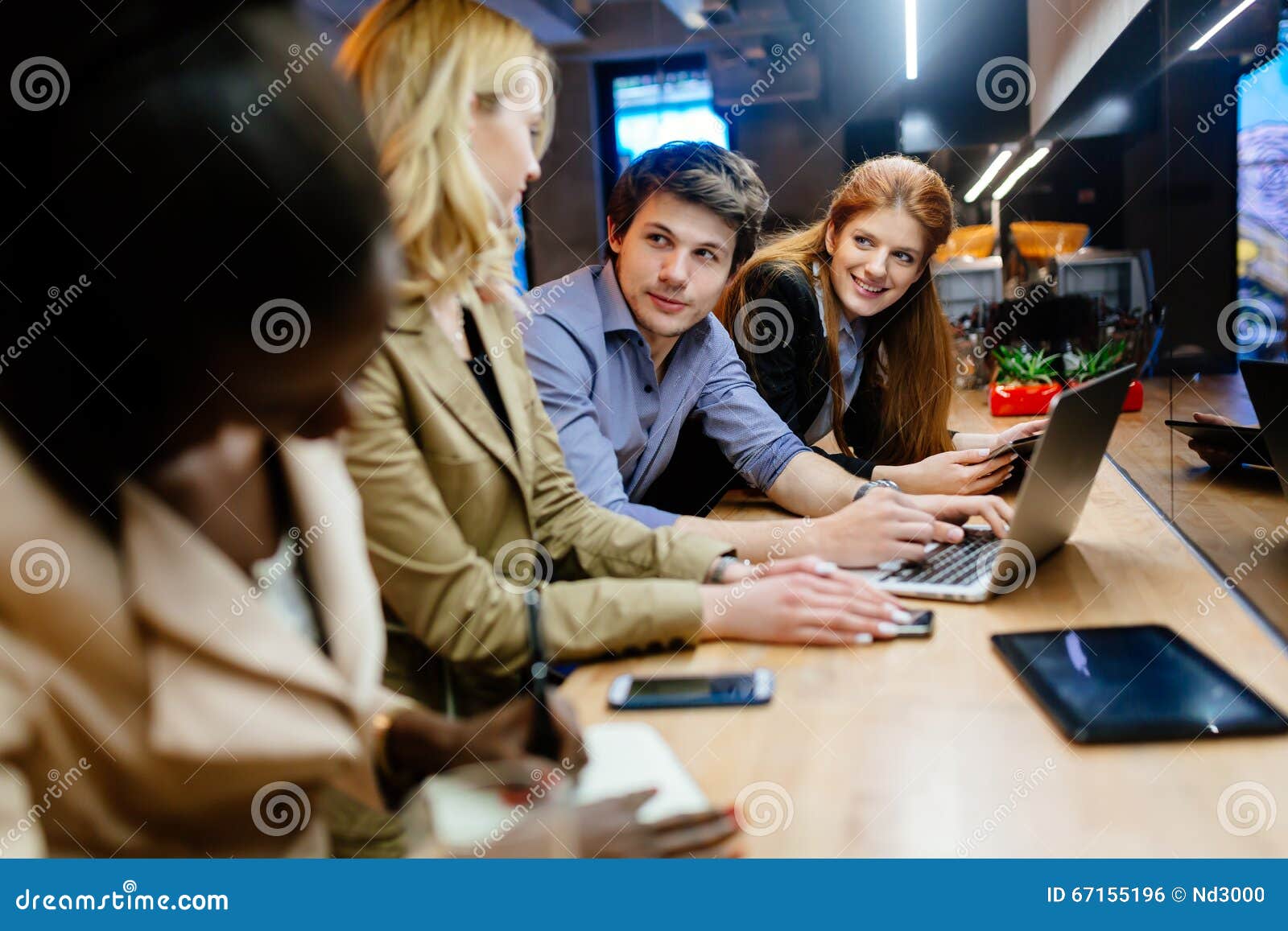 Coworkers bonding in pub stock photo. Image of lifestyles - 67155196