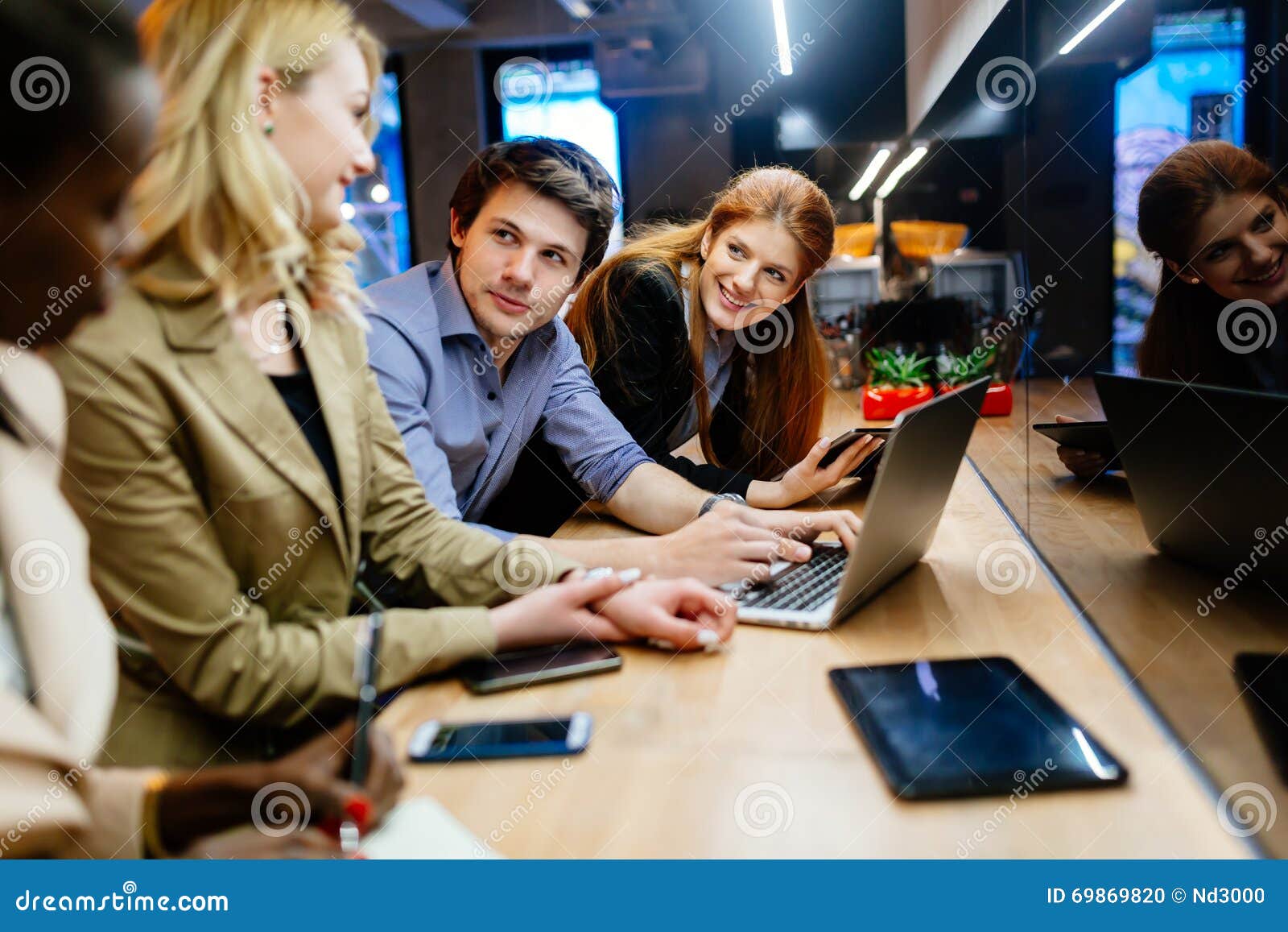 Coworkers bonding in pub stock photo. Image of indoors - 69869820