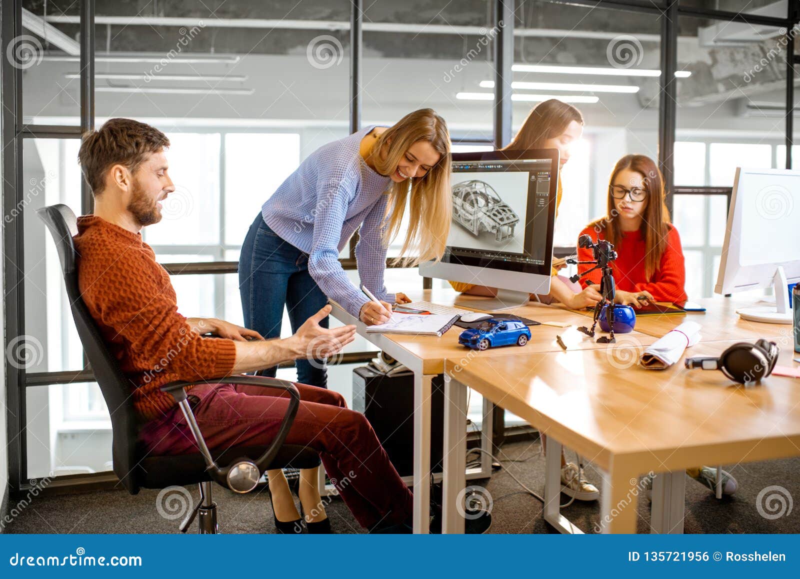 Coworkers Designing a Car Model Stock Photo - Image of developer ...