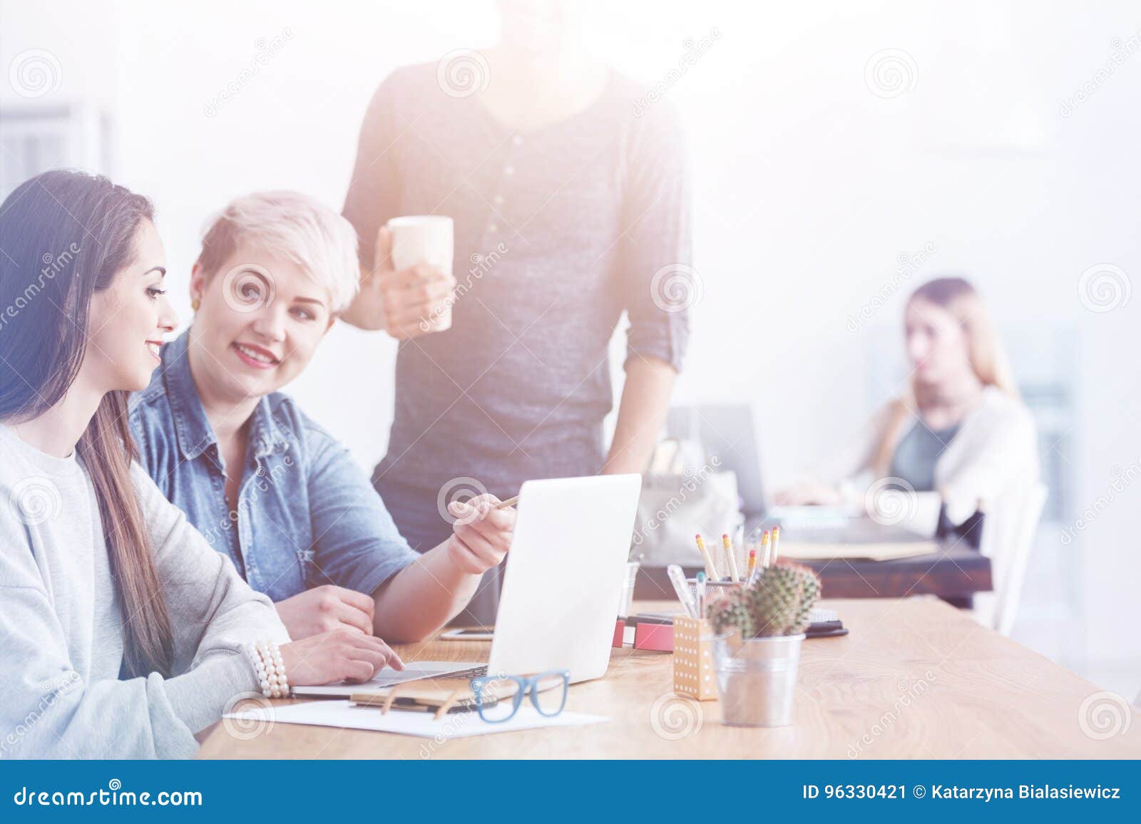 Coworkers Discussing Project Stock Image - Image of employees, blurred ...