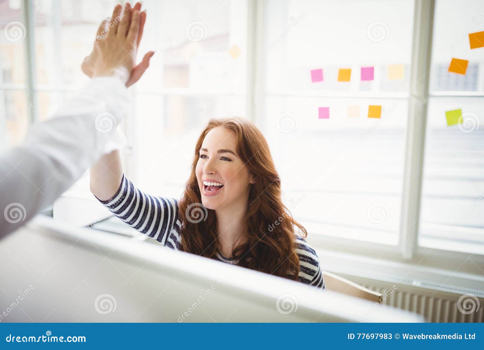 Coworkers Giving High-five in Creative Office Stock Image - Image of ...