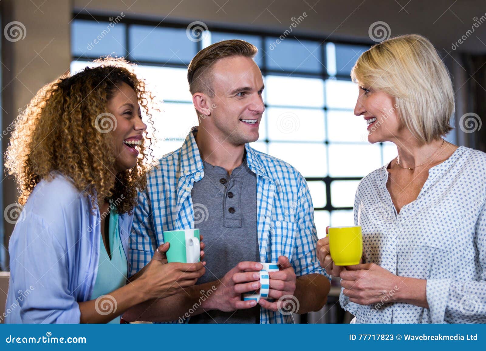 Coworkers Having Coffee in Office Stock Image - Image of mixedrace ...