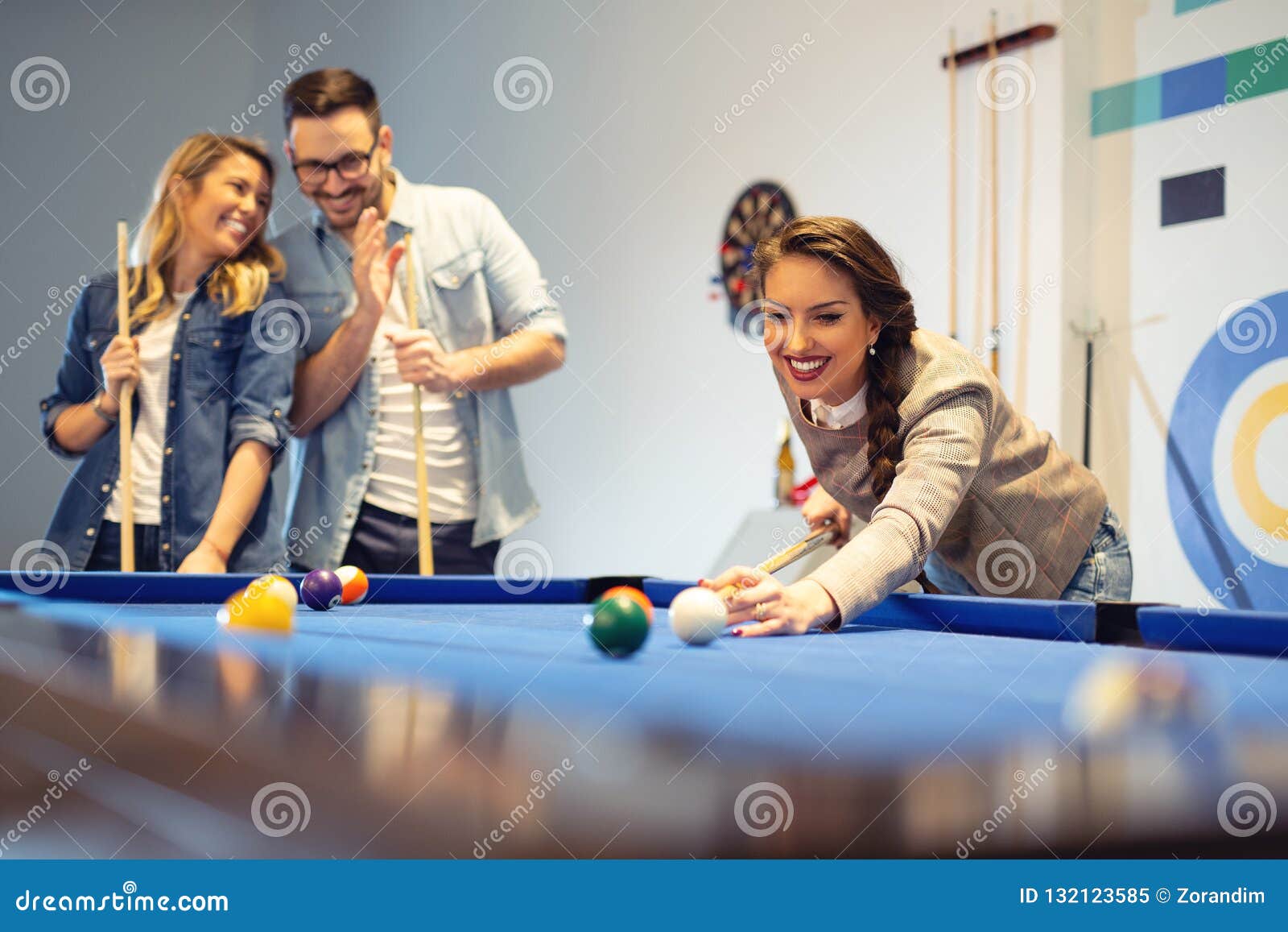 Coworkers Playing a Game Pool after a Long Work Day Stock Image - Image ...