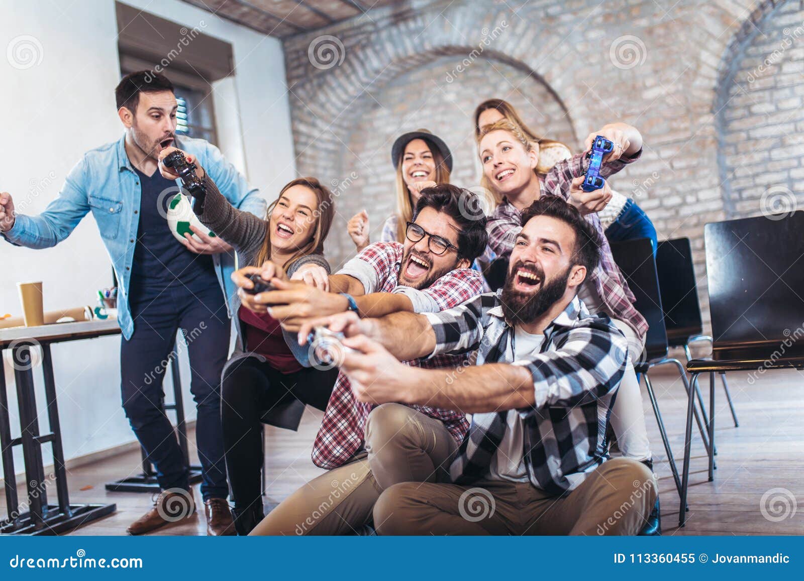 Coworkers Playing Video Games Stock Image - Image of coworkers, playing ...
