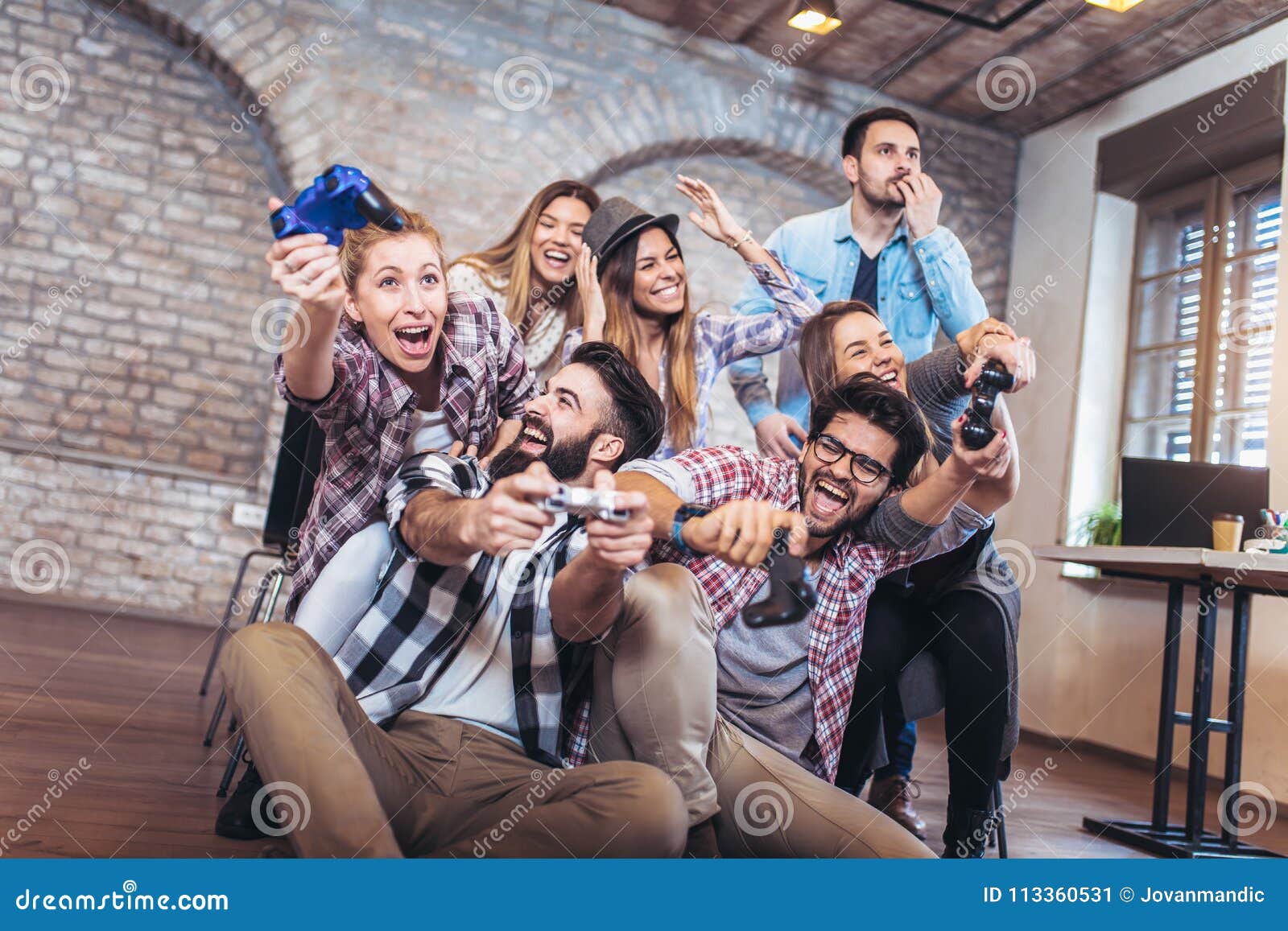 Coworkers Playing Video Games in Office. Stock Image - Image of friends ...