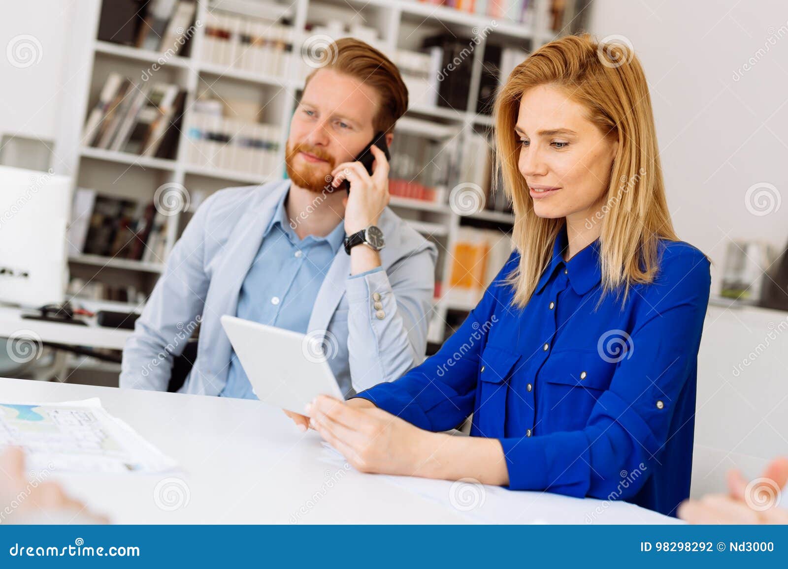 Coworkers Sharing Ideas in Office Stock Photo - Image of organization ...