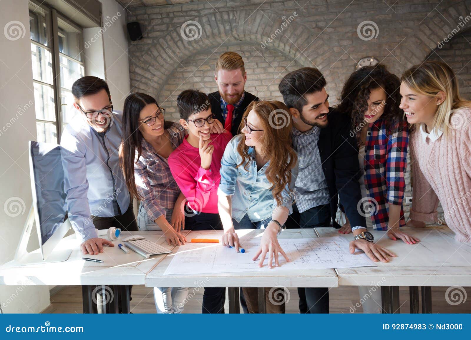 Coworkers Working on Project Together in Office Stock Image - Image of ...