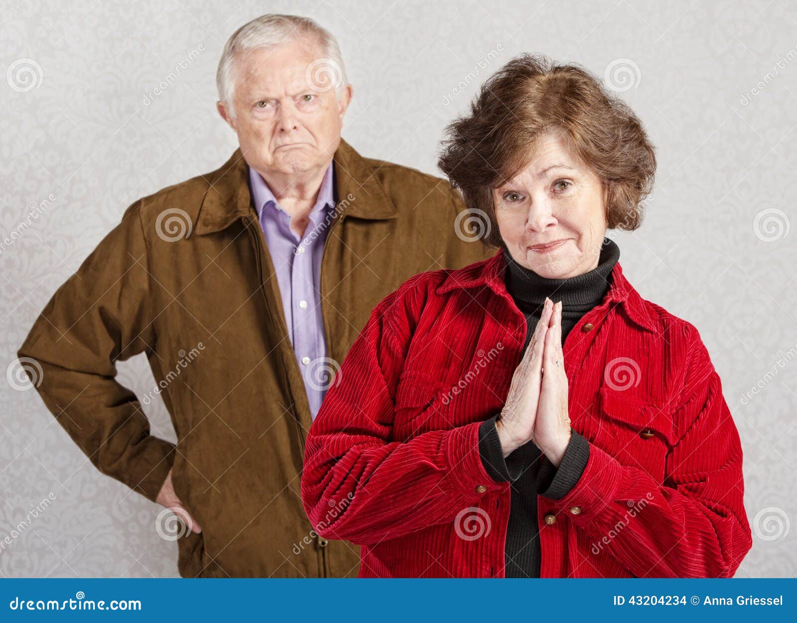 Coy Woman with Grumpy Man stock photo. Image of married - 43204234