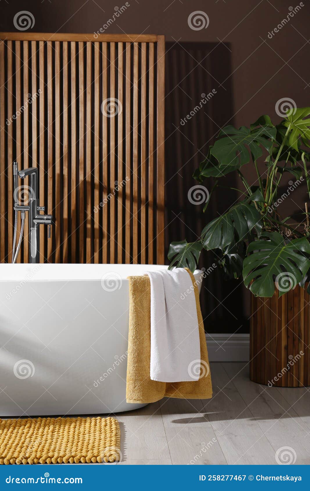 Cozy Bathroom Interior with Stylish Ceramic Tub Stock Image - Image of ...