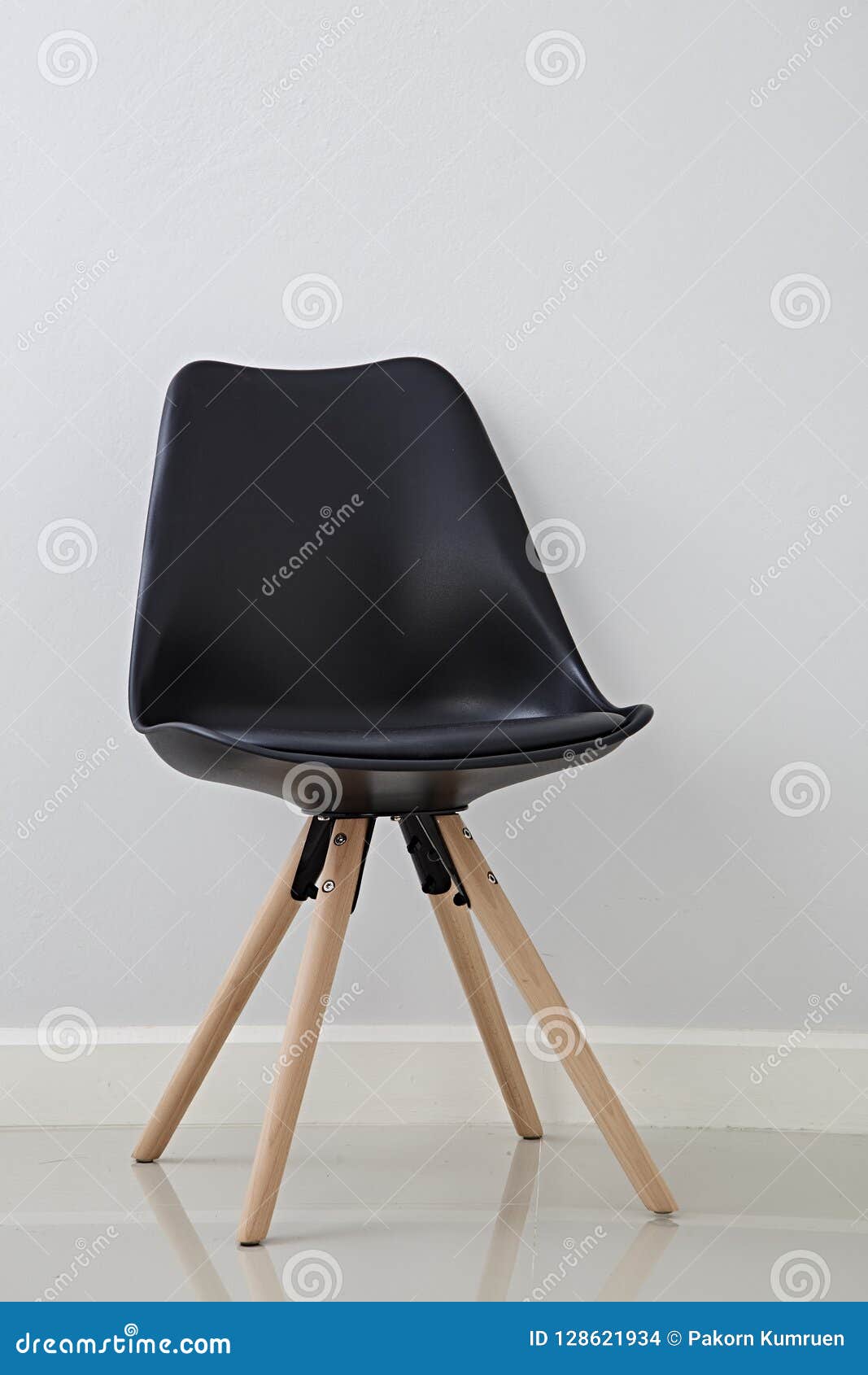 Cozy Chair on Wall Background Stock Photo - Image of house, home: 128621934