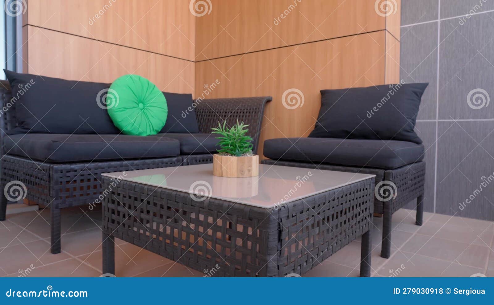 A Cozy Corner on the Balcony with a Coffee Table and a Sofa for ...