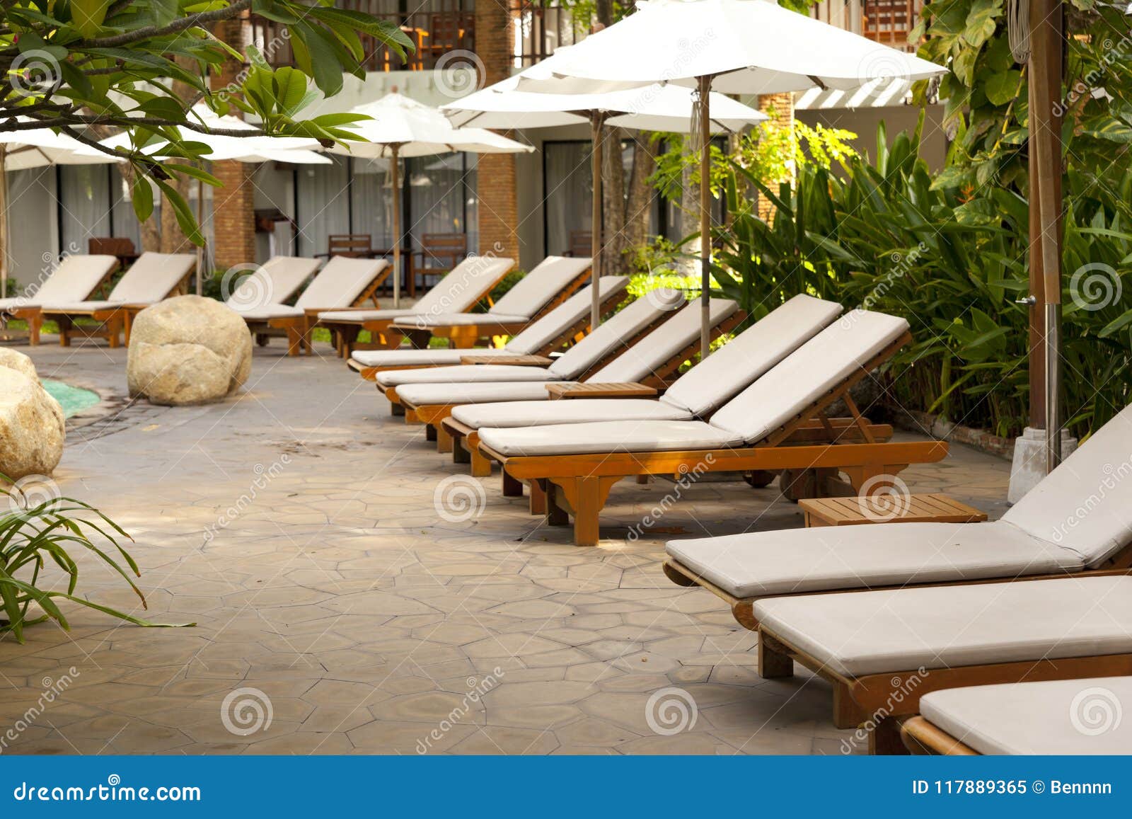 Cozy daybed by the pool stock image. Image of style - 117889365