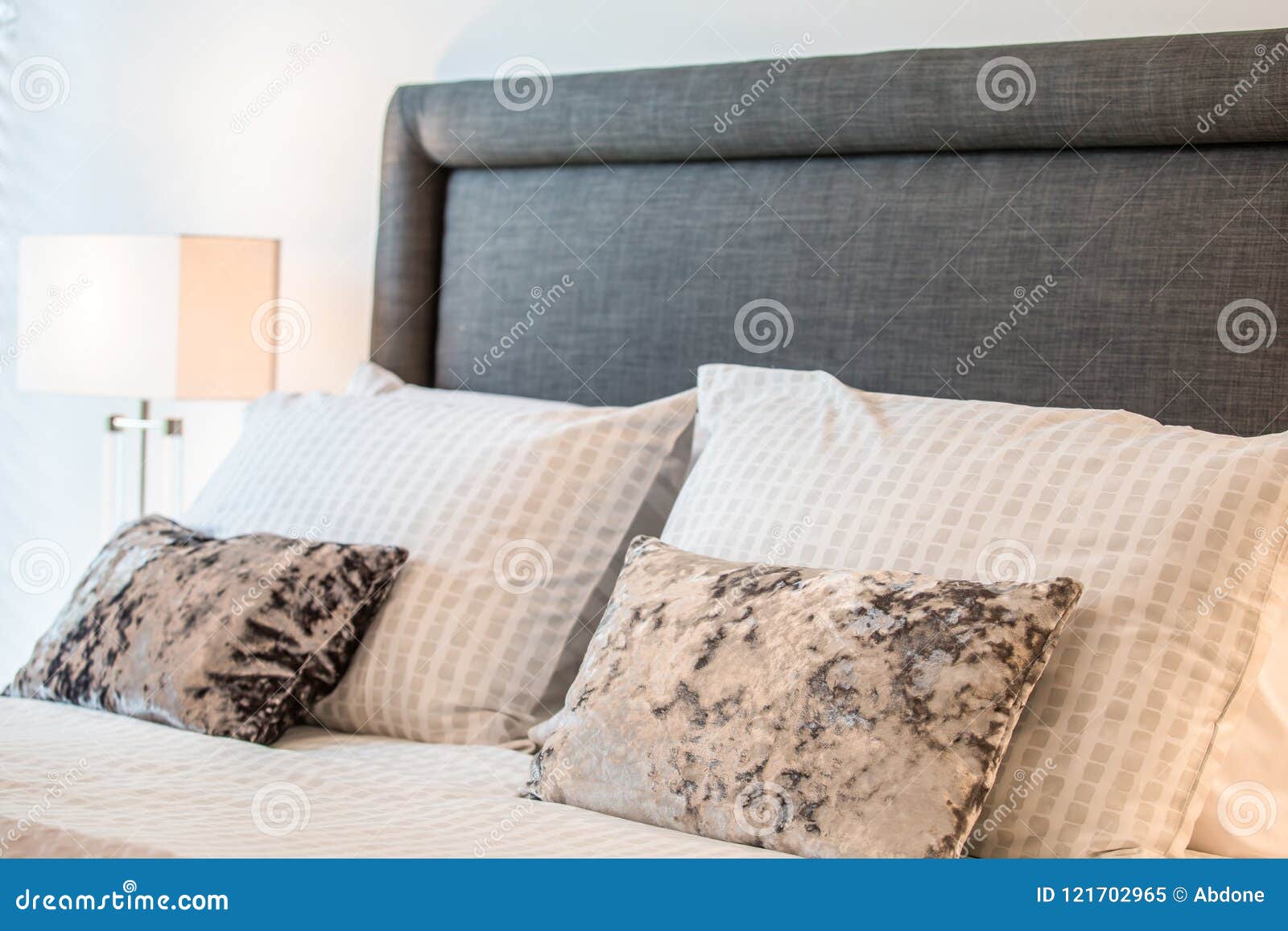 Cozy Decorative Pillows on a Bed Stock Image - Image of sleep, sheets ...